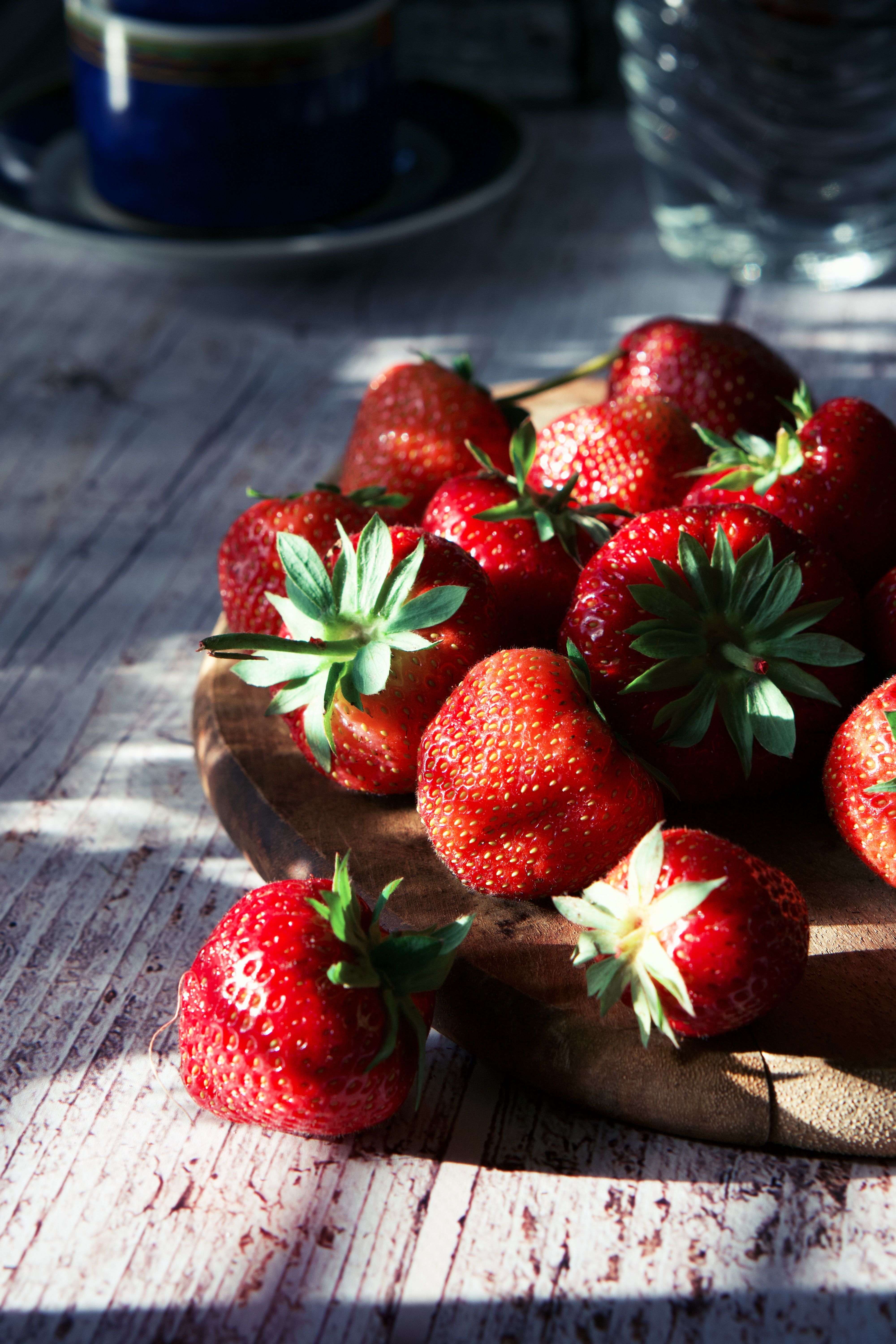 Strawberries on Brown Wooden Board · Free Stock Photo
