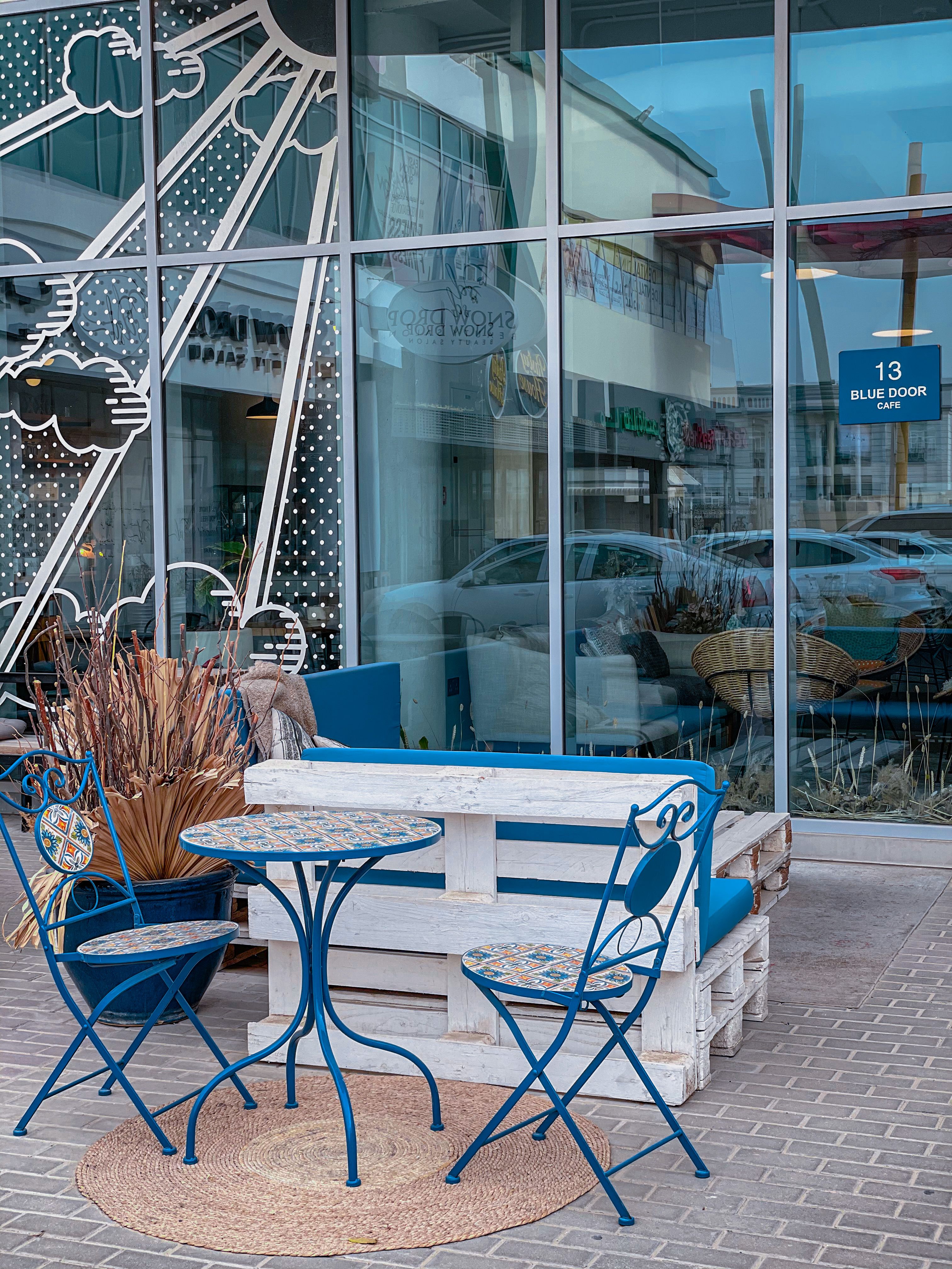 Outdoor Sitting of a Coffee Shop · Free Stock Photo