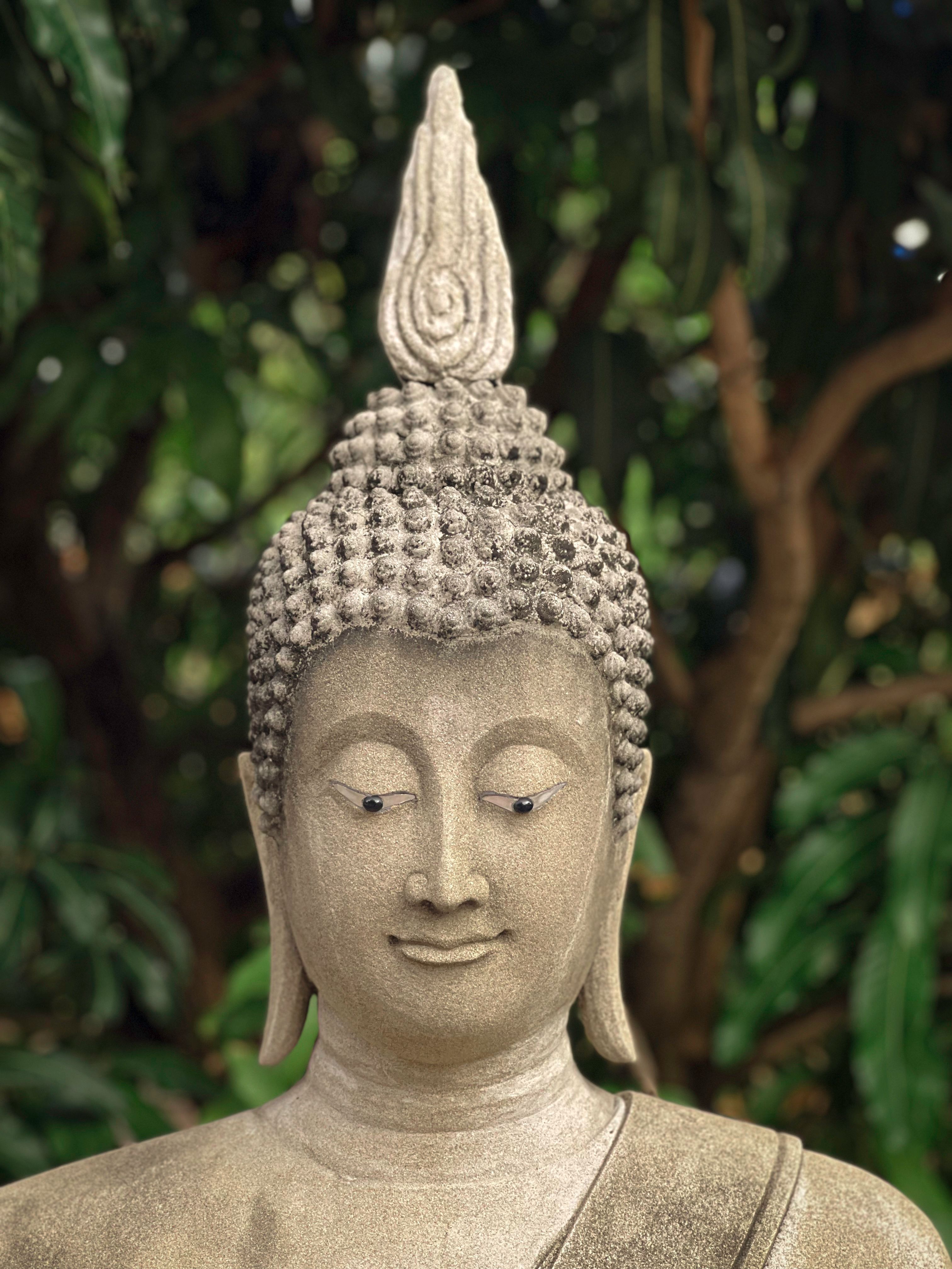 A Close-Up Shot of a Buddha Statue · Free Stock Photo