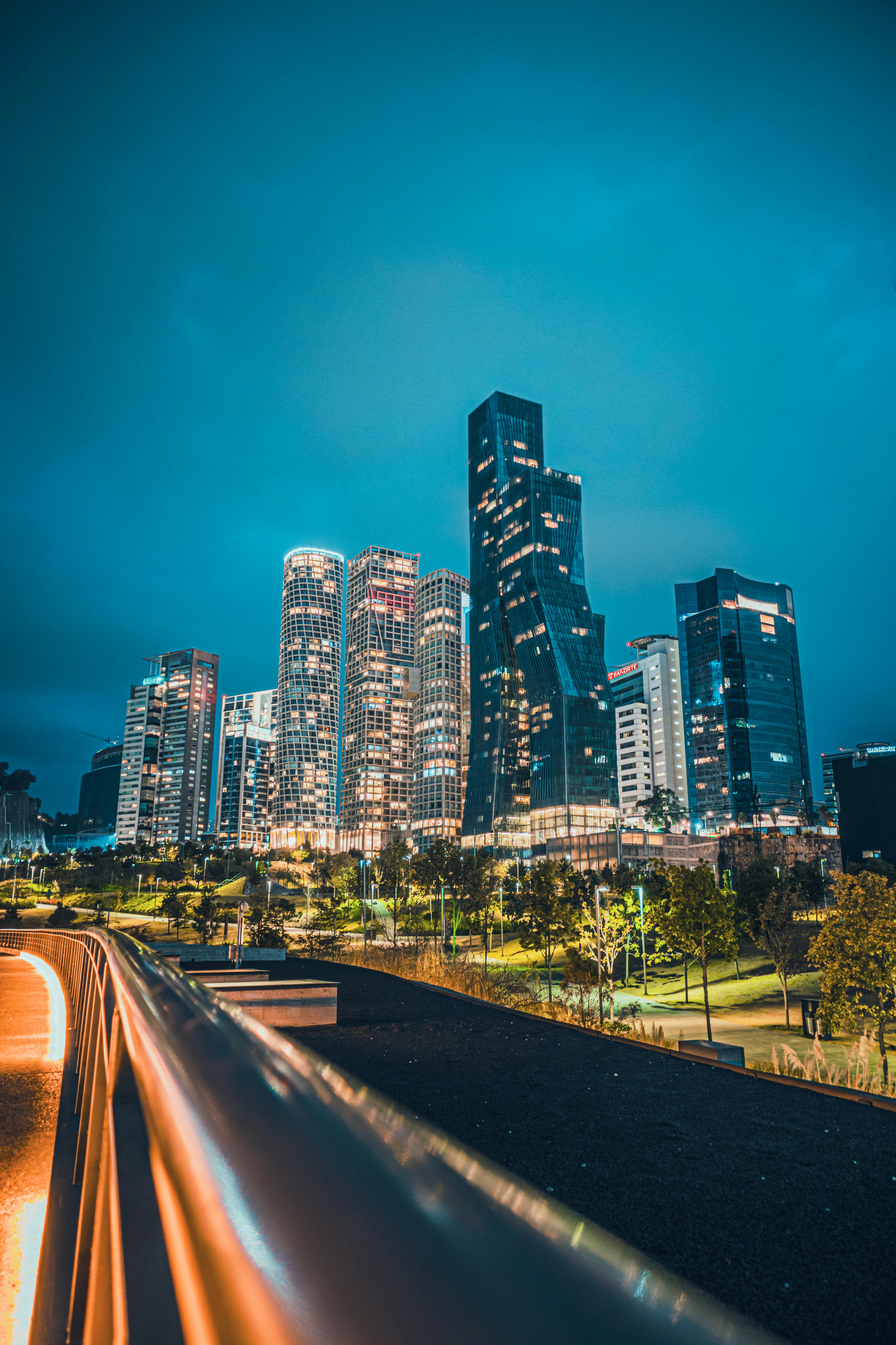 Photo Of High-rise Buildings During Night Time · Free Stock Photo
