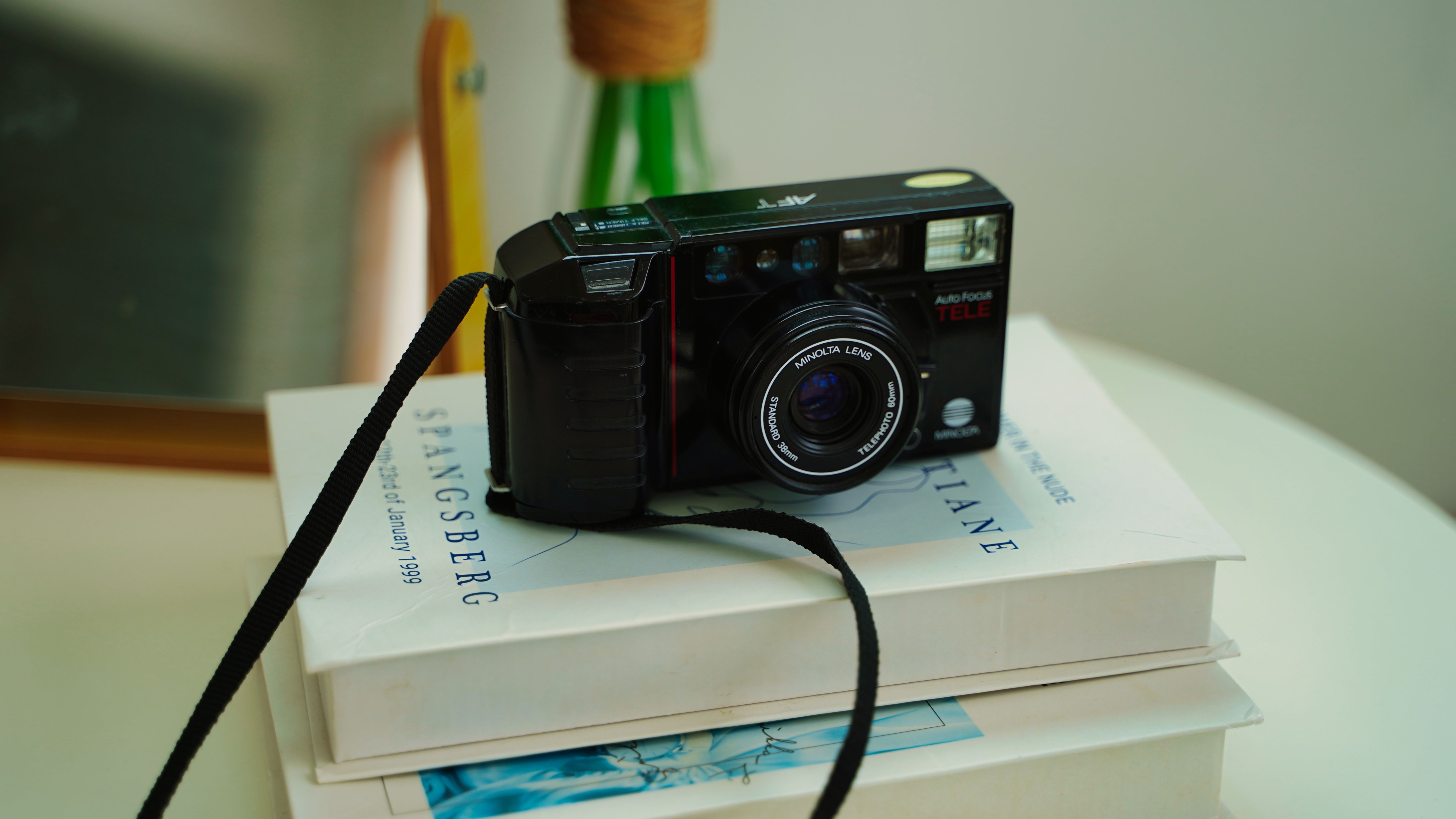 Black Camera on White Book · Free Stock Photo
