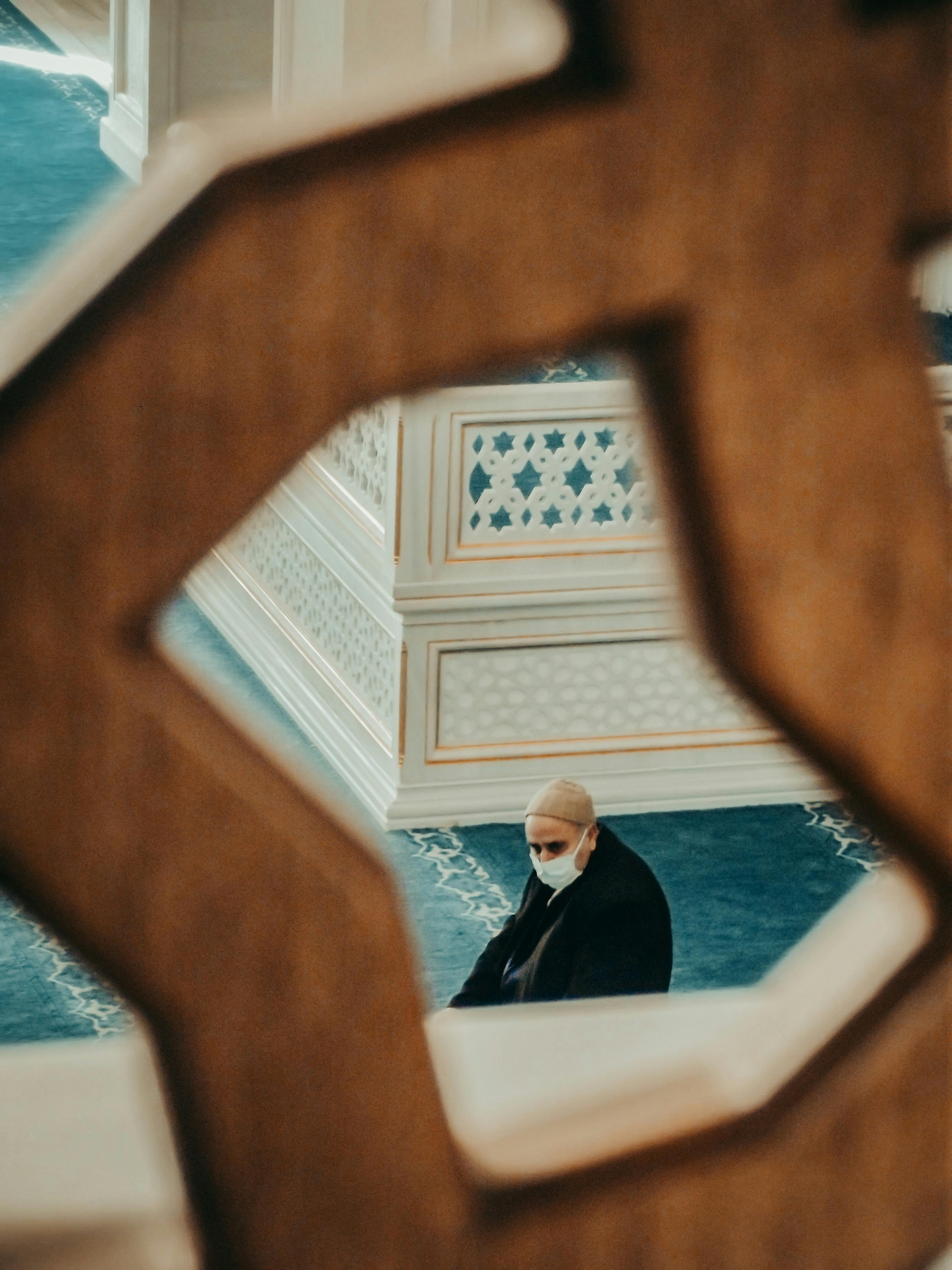 Man Wearing Mask in Mosque · Free Stock Photo