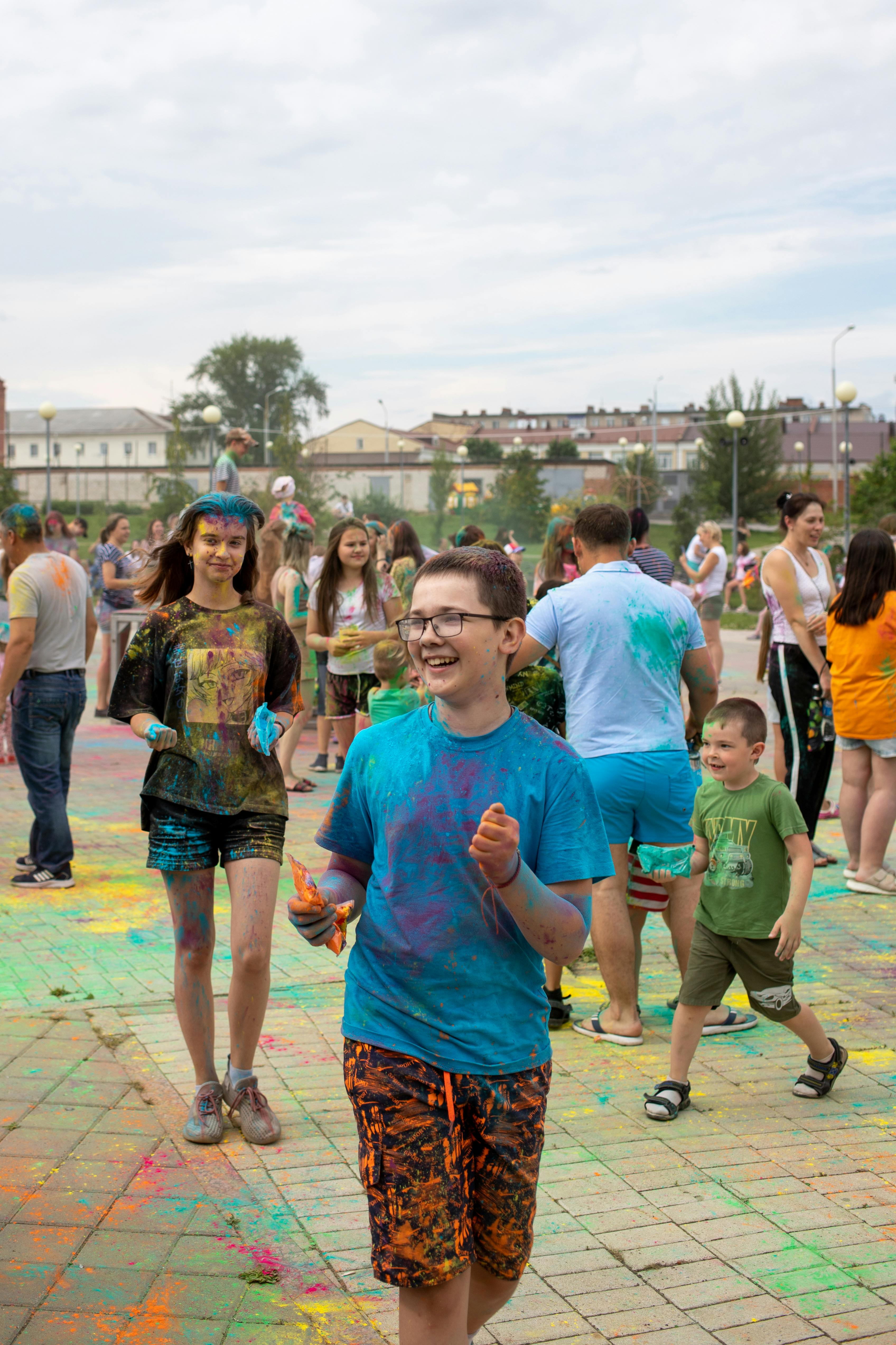 Children with Colored Powders on their Faces · Free Stock Photo