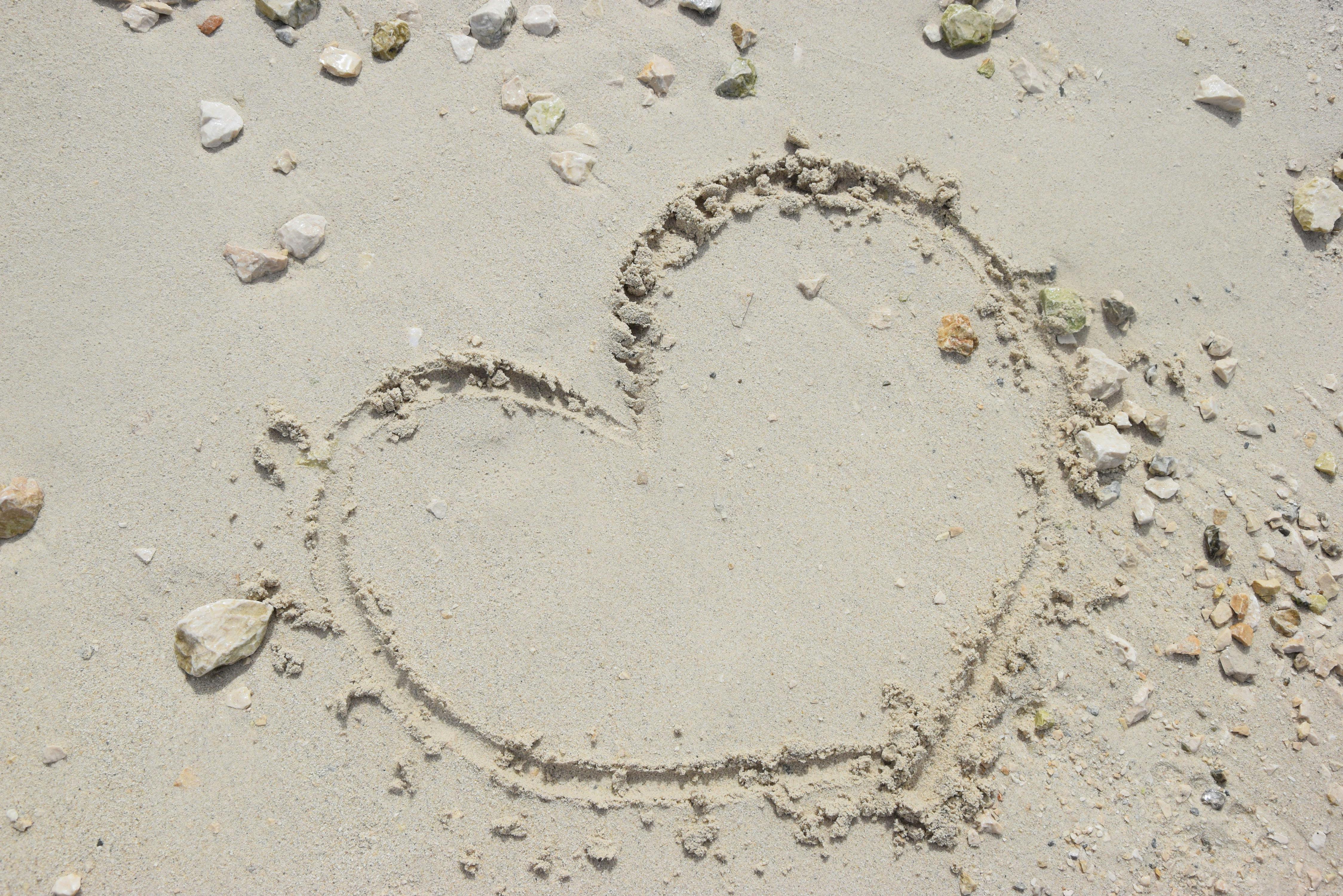 Heart-shaped Drawing on a Sand · Free Stock Photo