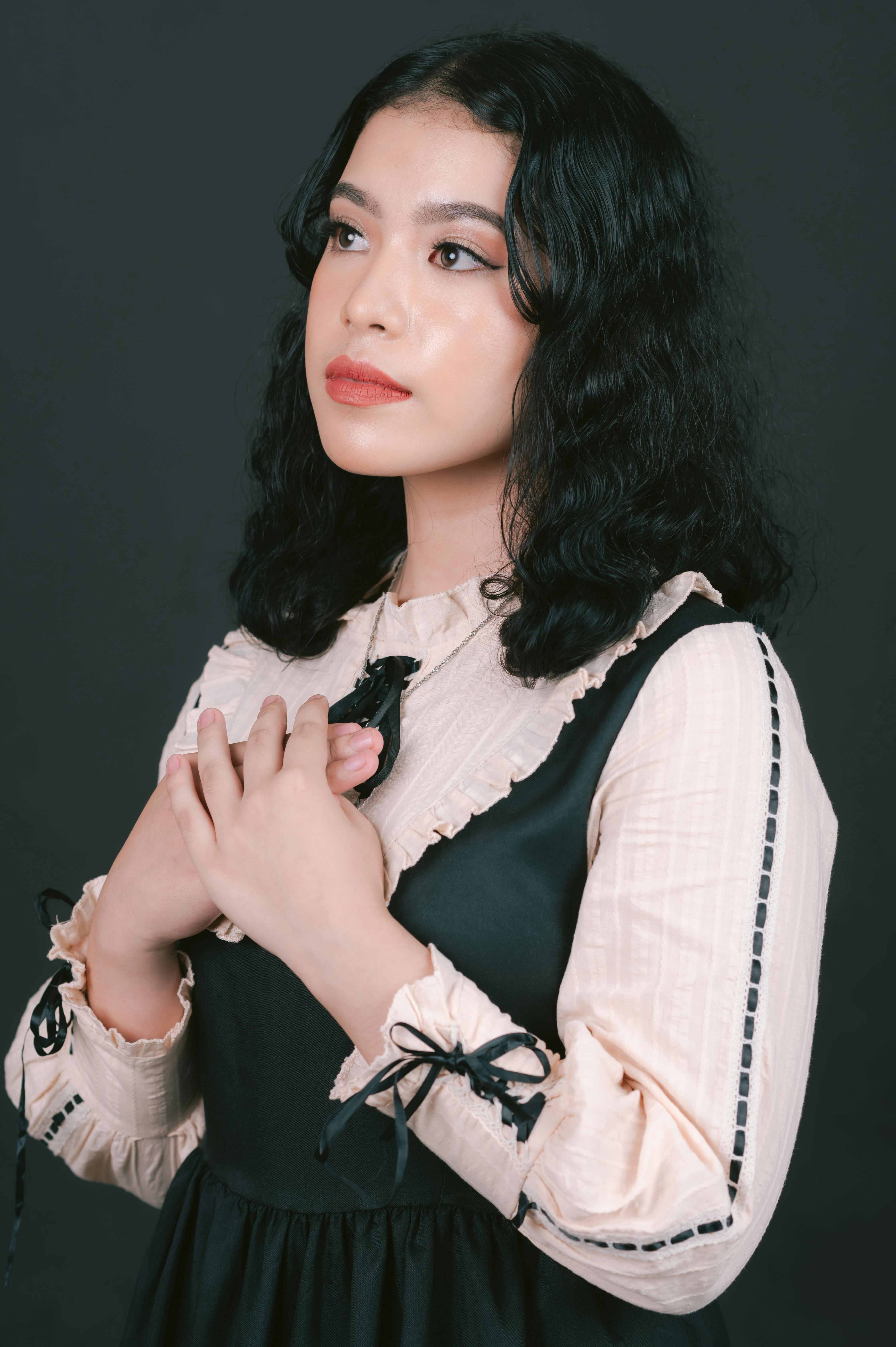 Blonde Woman Showing Her Index Finger · Free Stock Photo