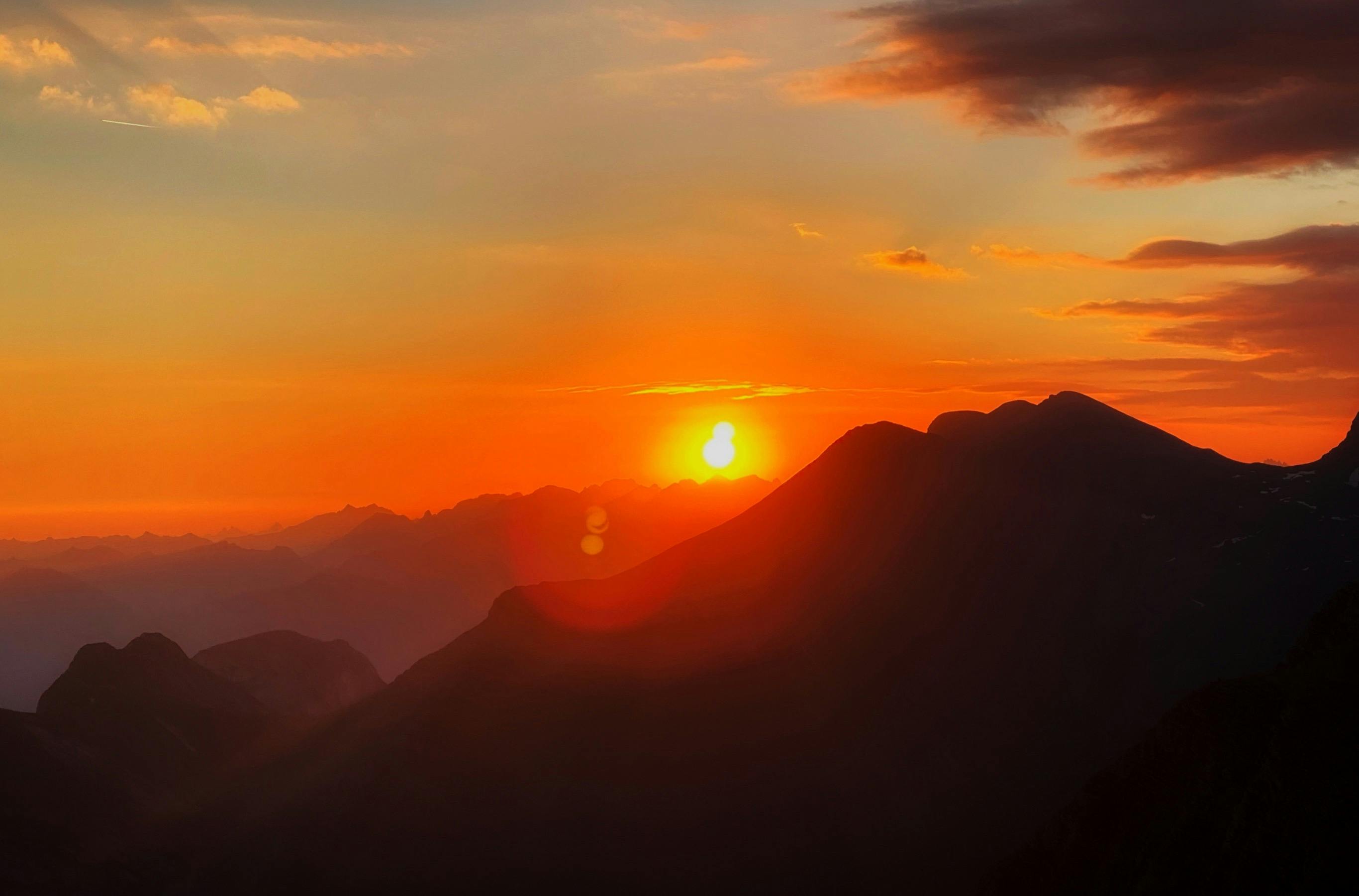 A Silhouette of Mountain During Sunset · Free Stock Photo