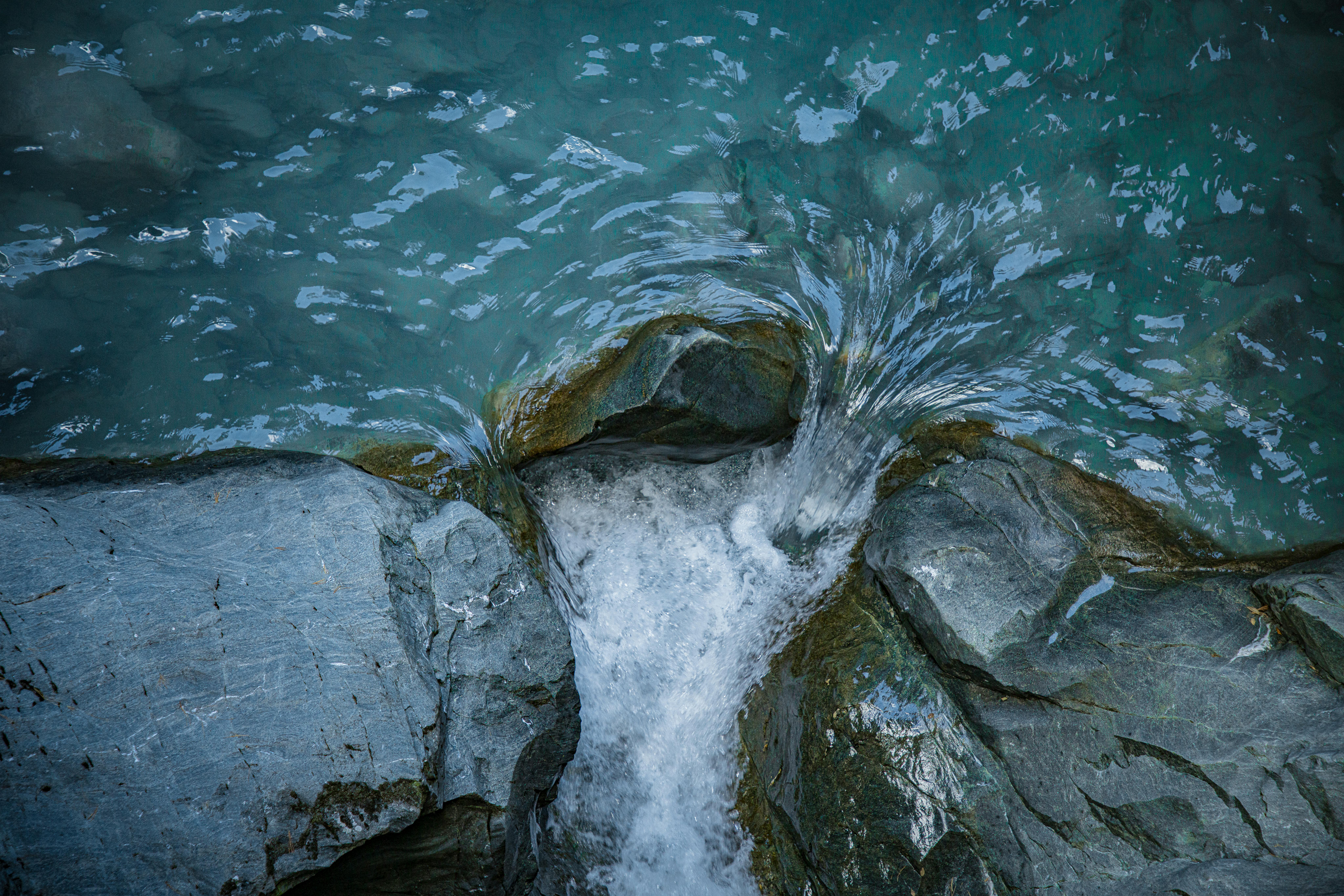 A Rock Formation on Body of Water · Free Stock Photo
