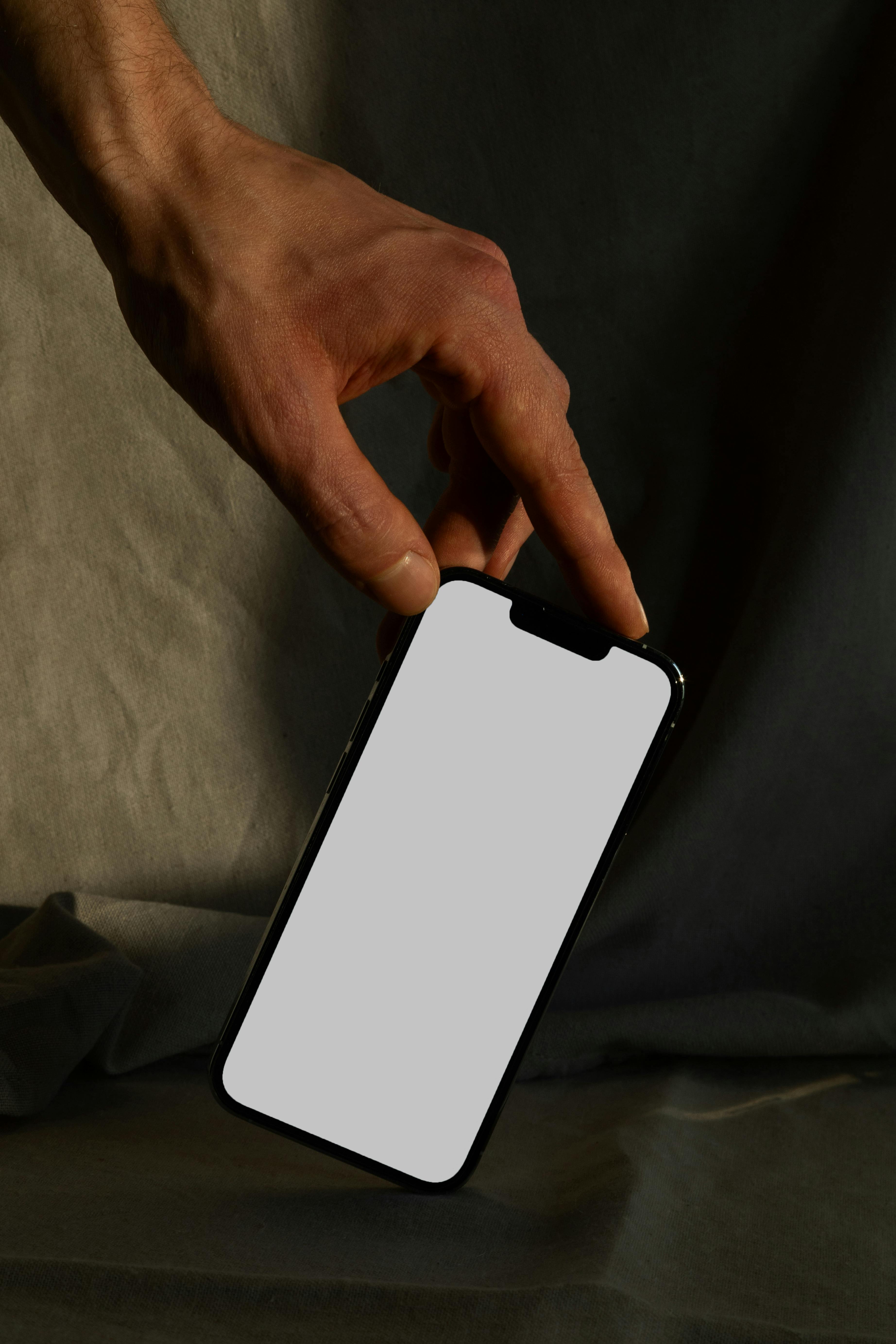 Hand Holding an Iphone · Free Stock Photo