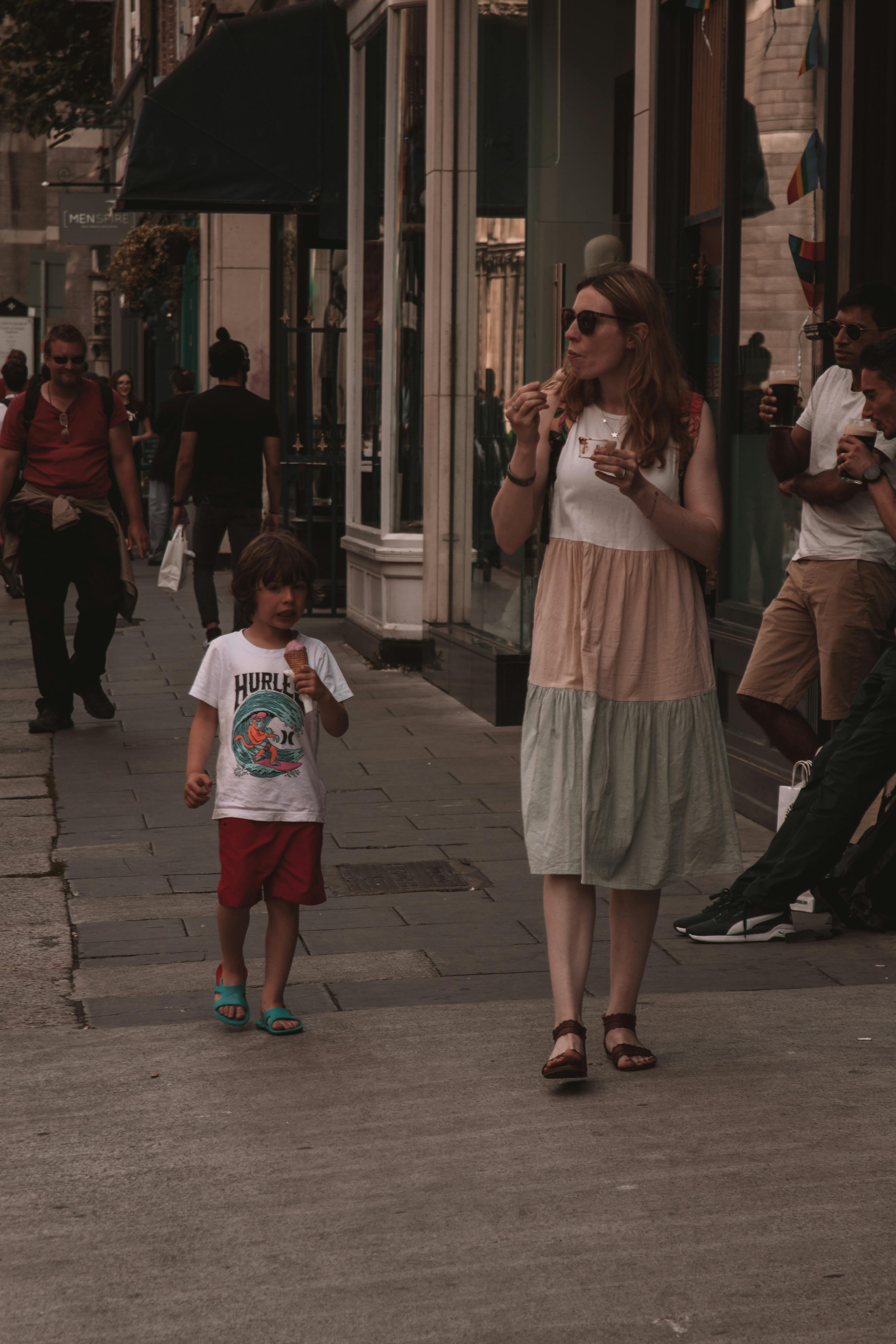 Kids Sitting on the Sand Eating Ice Cream Stick · Free Stock Photo