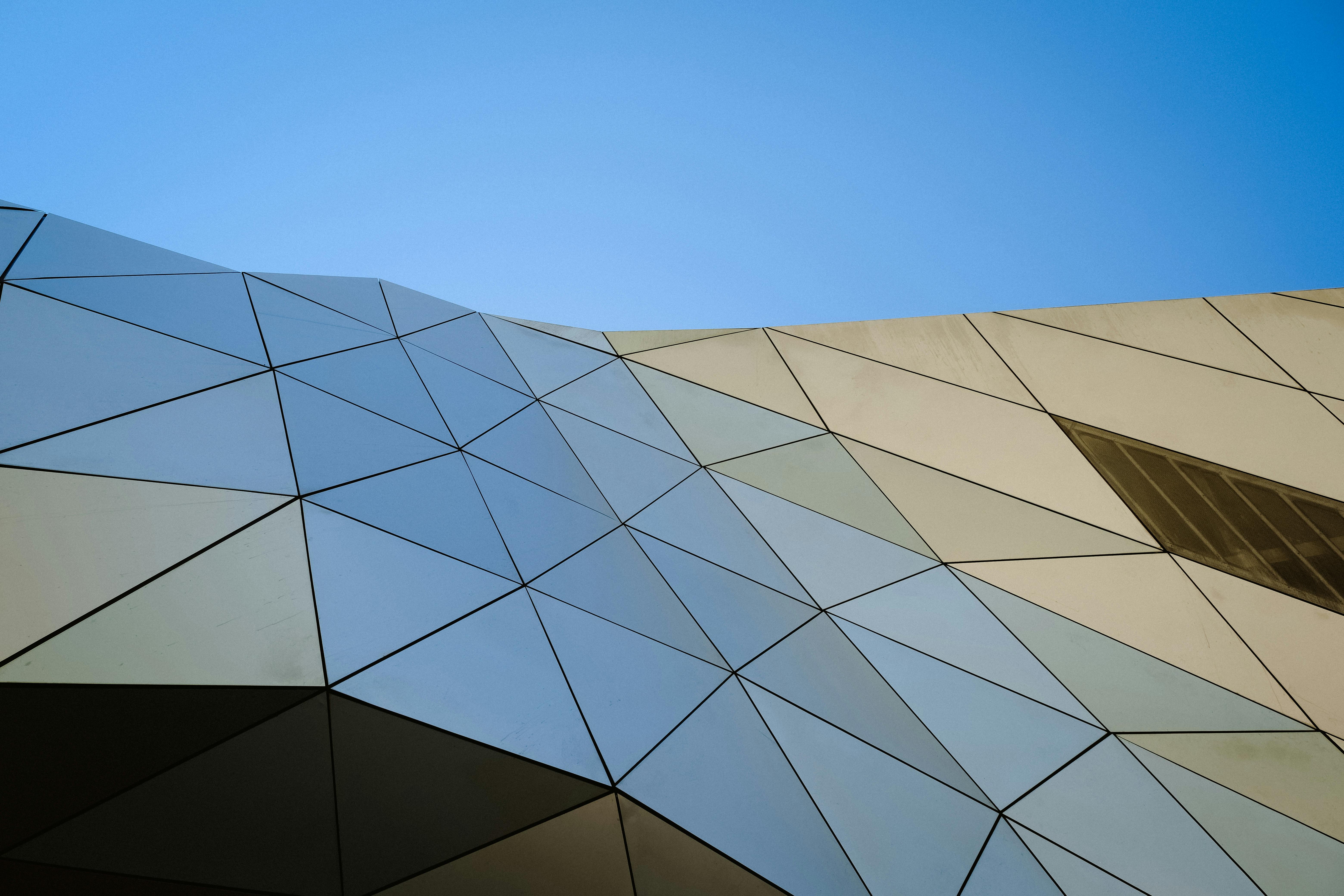 Low Angle Photo of Gray Buildings · Free Stock Photo