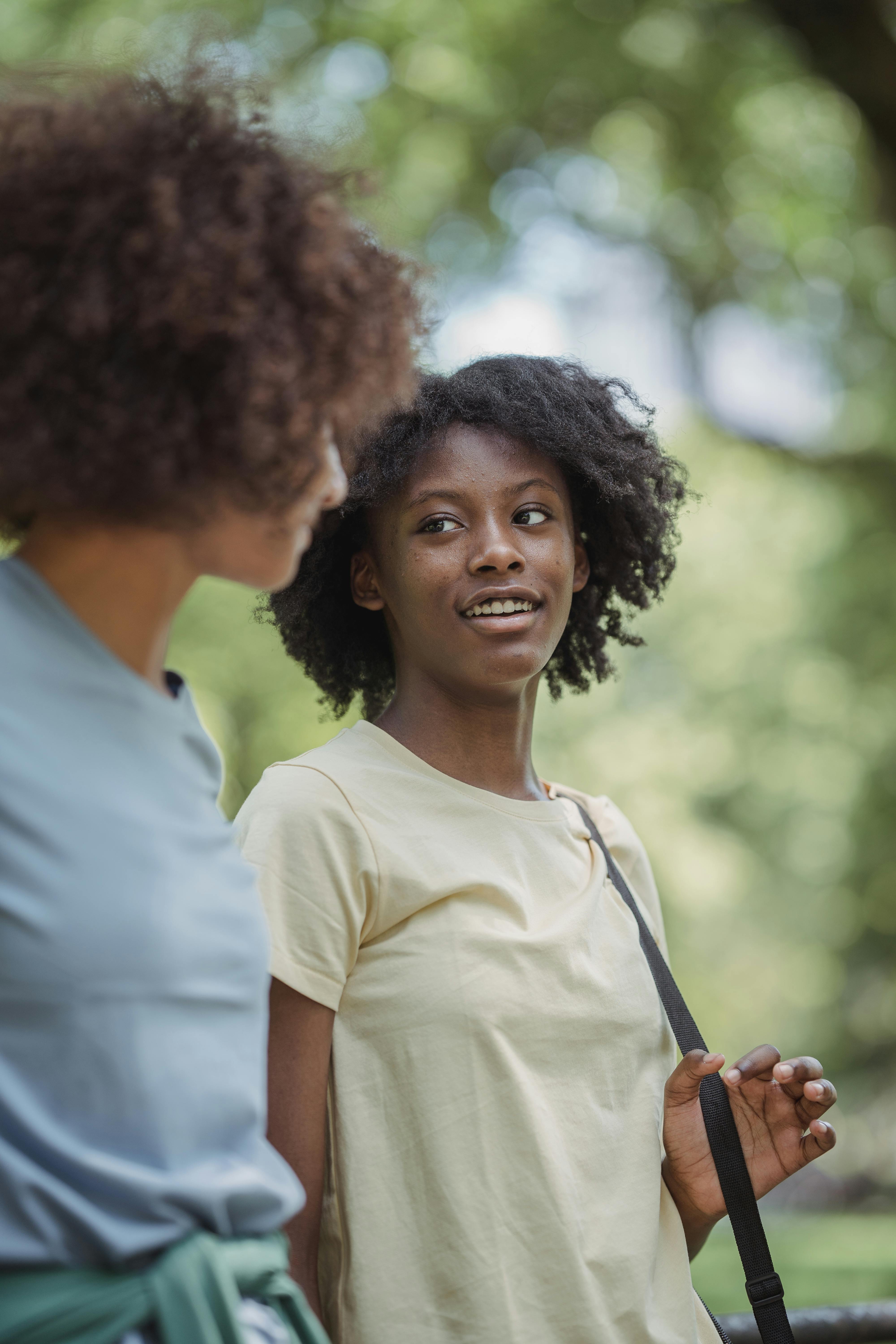 Girls Talking in a Park · Free Stock Photo