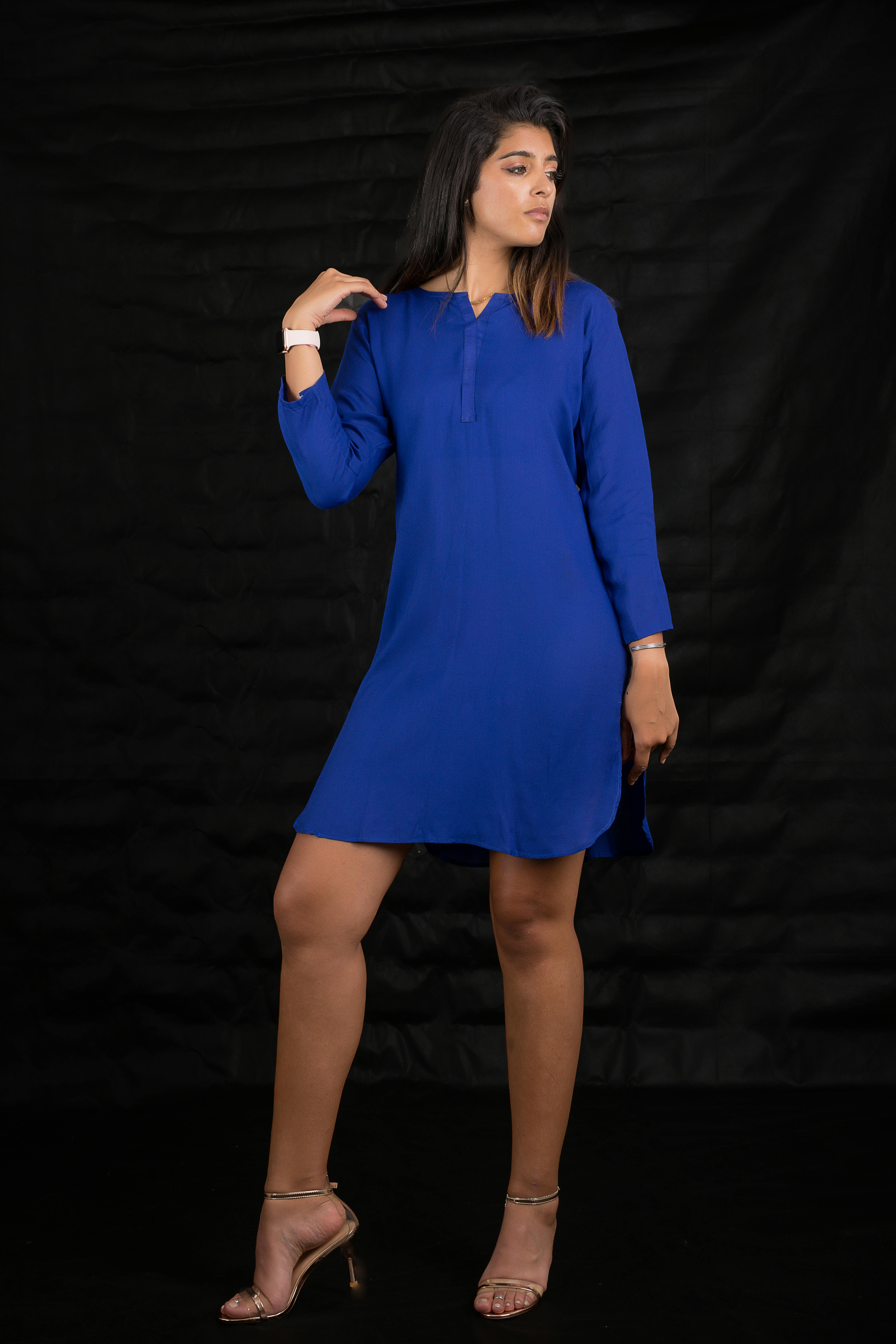 A Woman in Black Dress Wearing Heels · Free Stock Photo