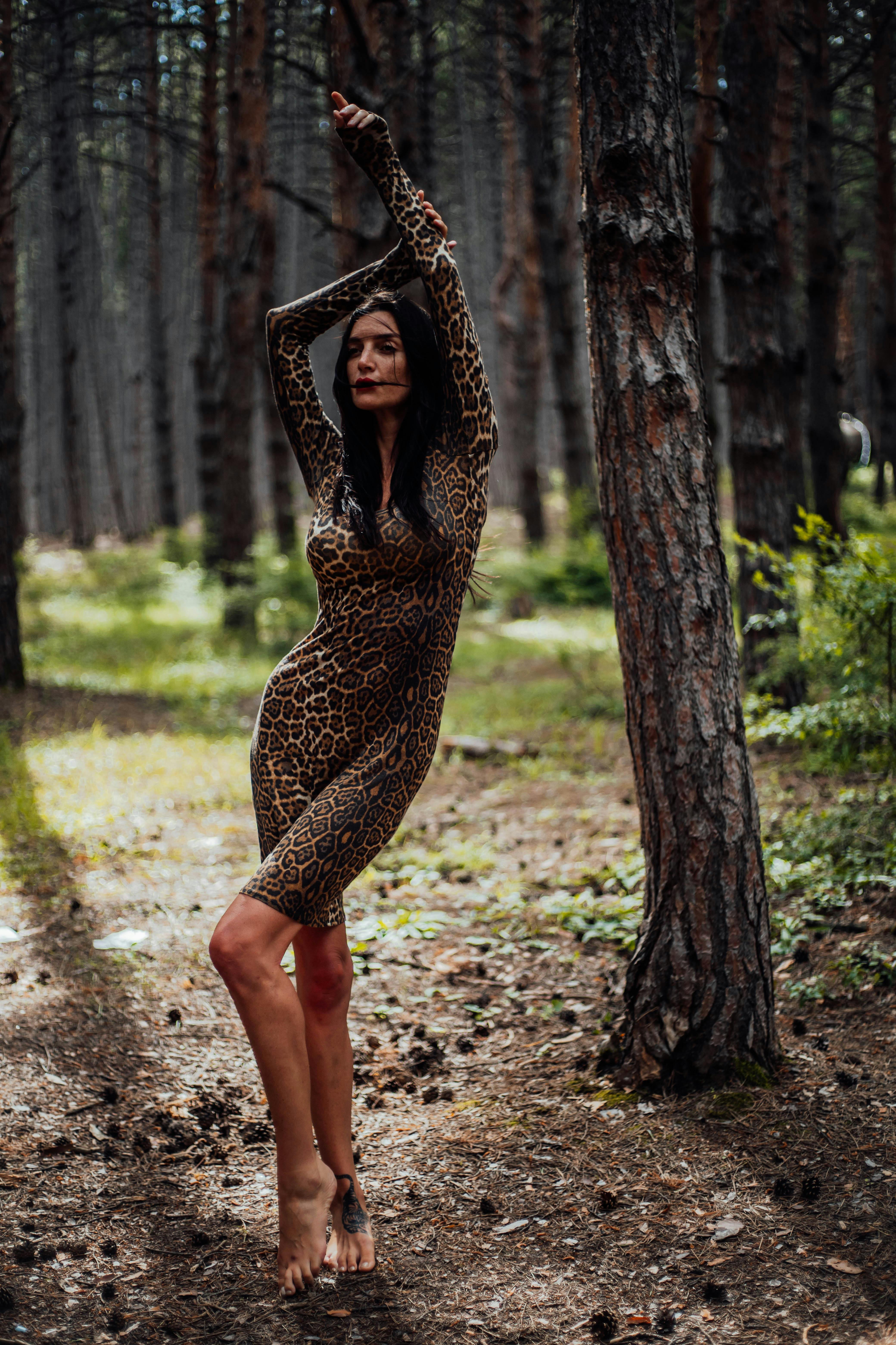 Woman Wearing Leopard Print Dress in the Forest · Free Stock Photo