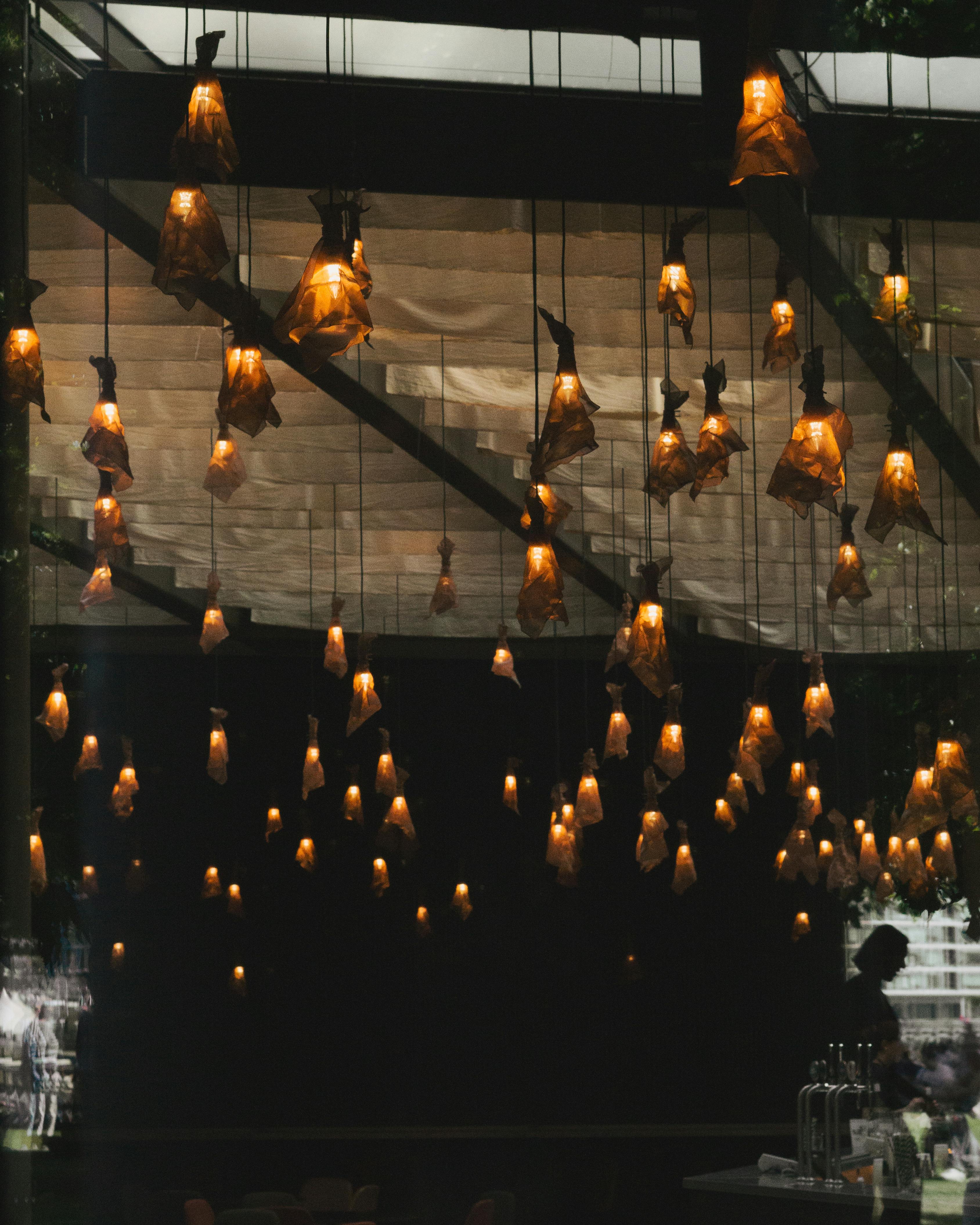 Illuminated Handing Lights Inside the Building · Free Stock Photo