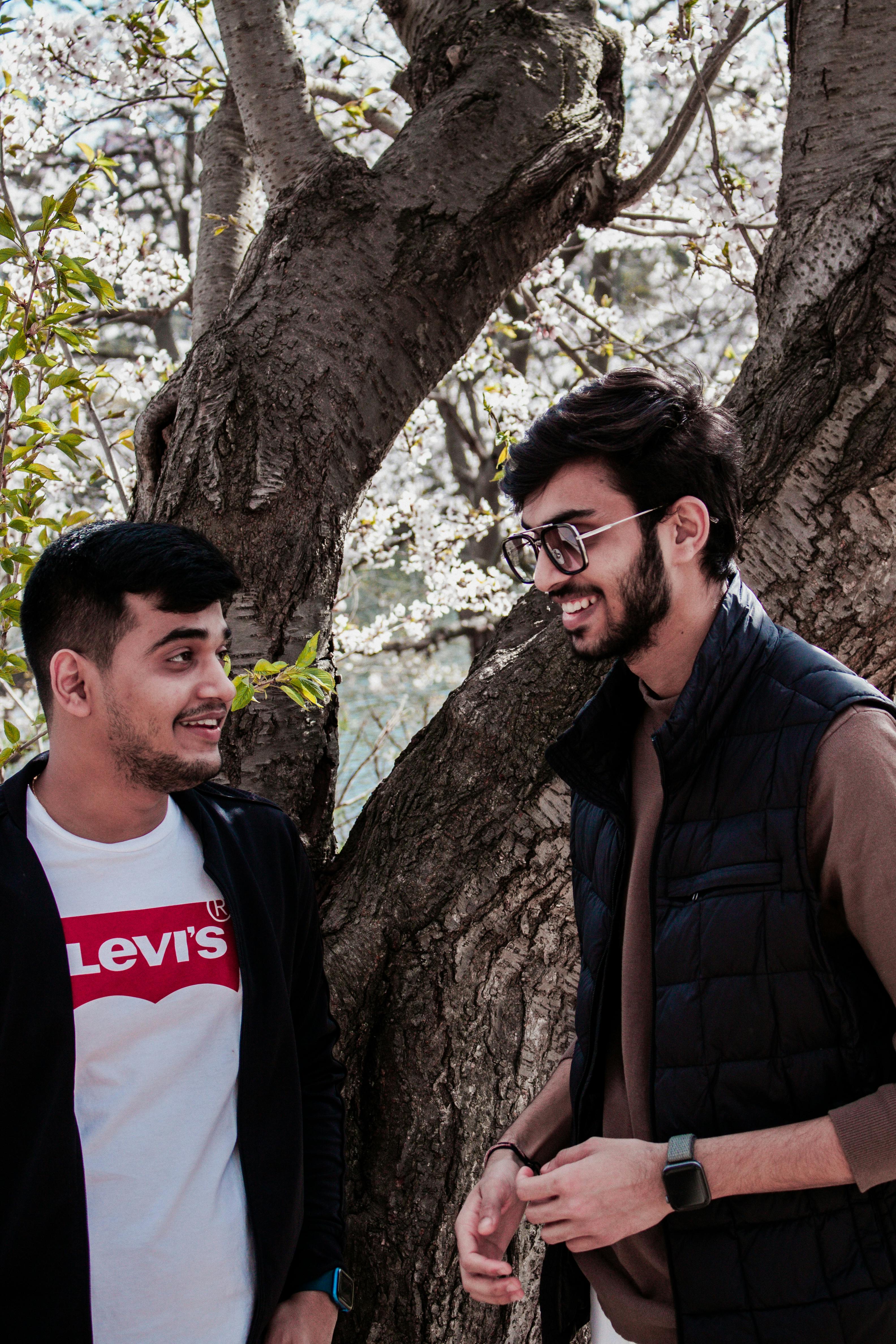 Two Men Talking Together · Free Stock Photo