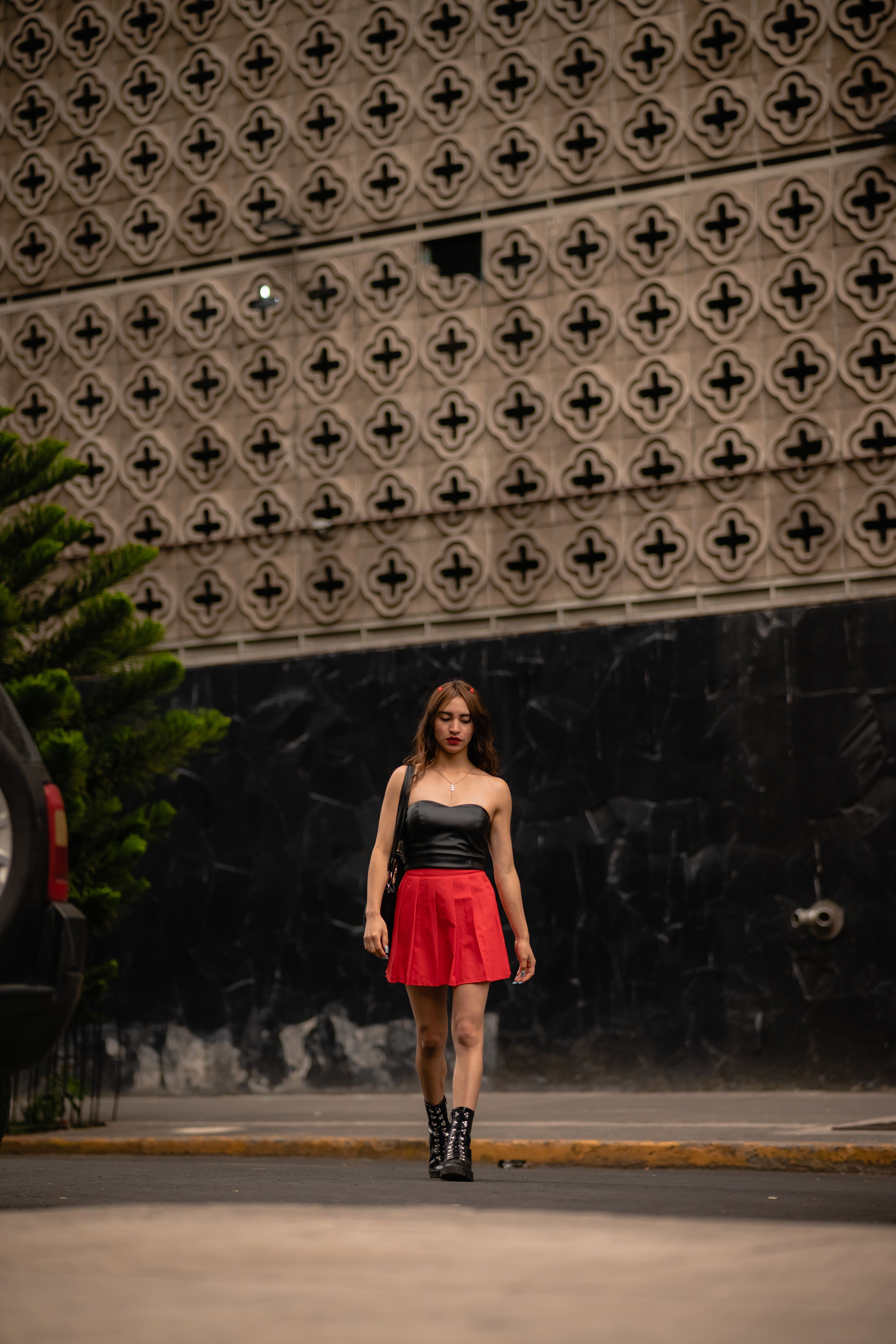 A Woman in a Skirt Covering the Sunlight · Free Stock Photo