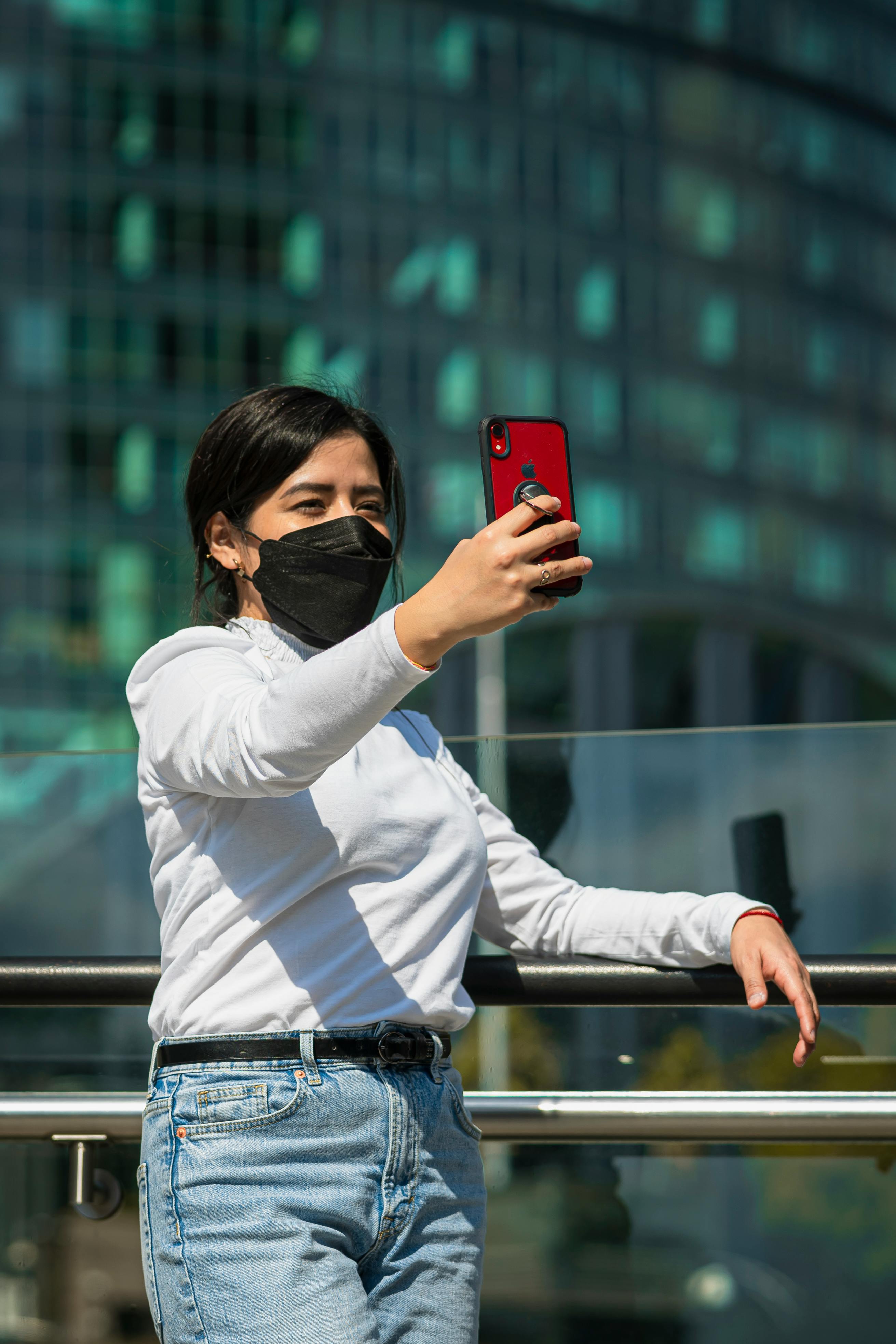 Woman Holding Silver Iphone 5s · Free Stock Photo