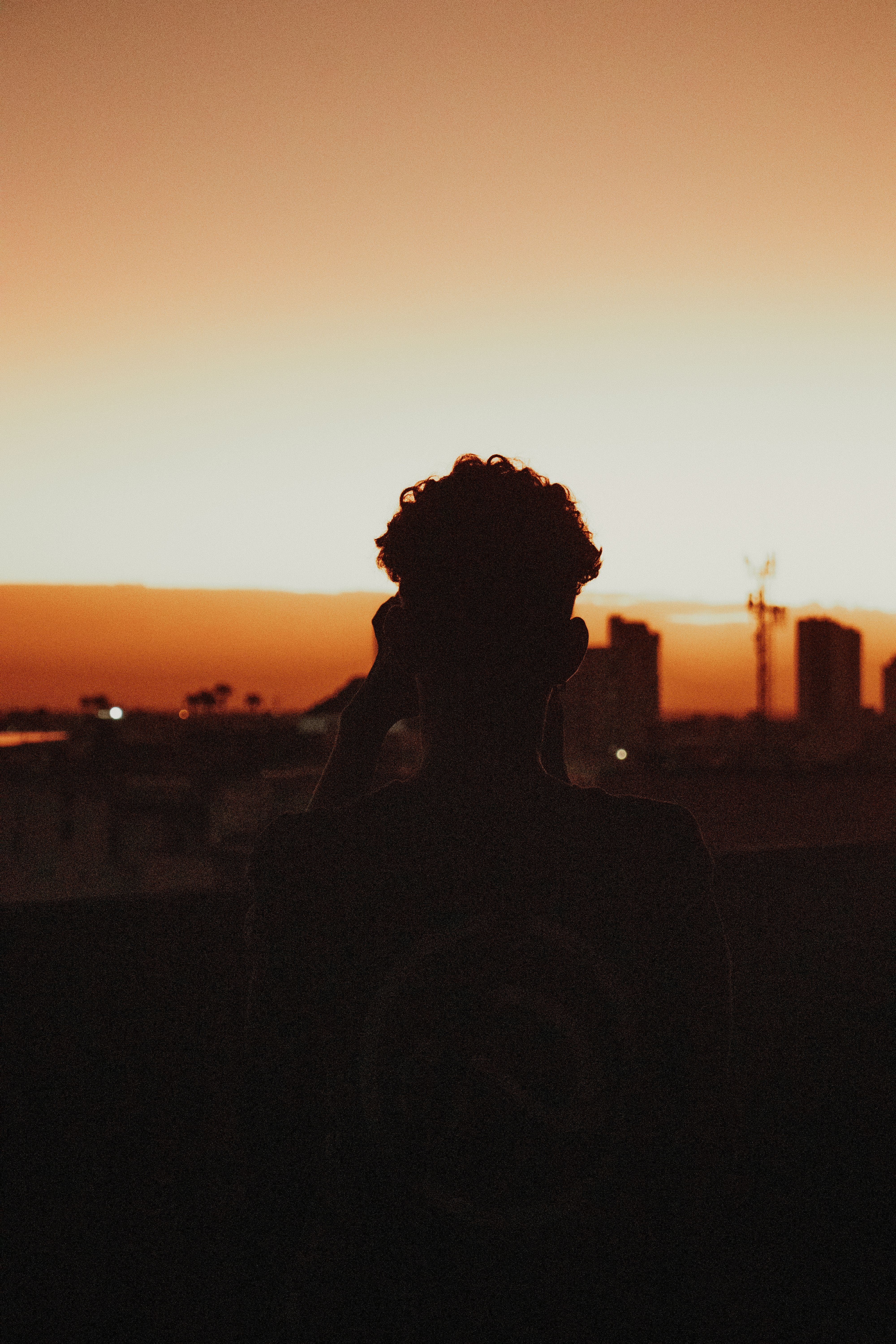 A Silhouette of a Man during the Golden Hour · Free Stock Photo