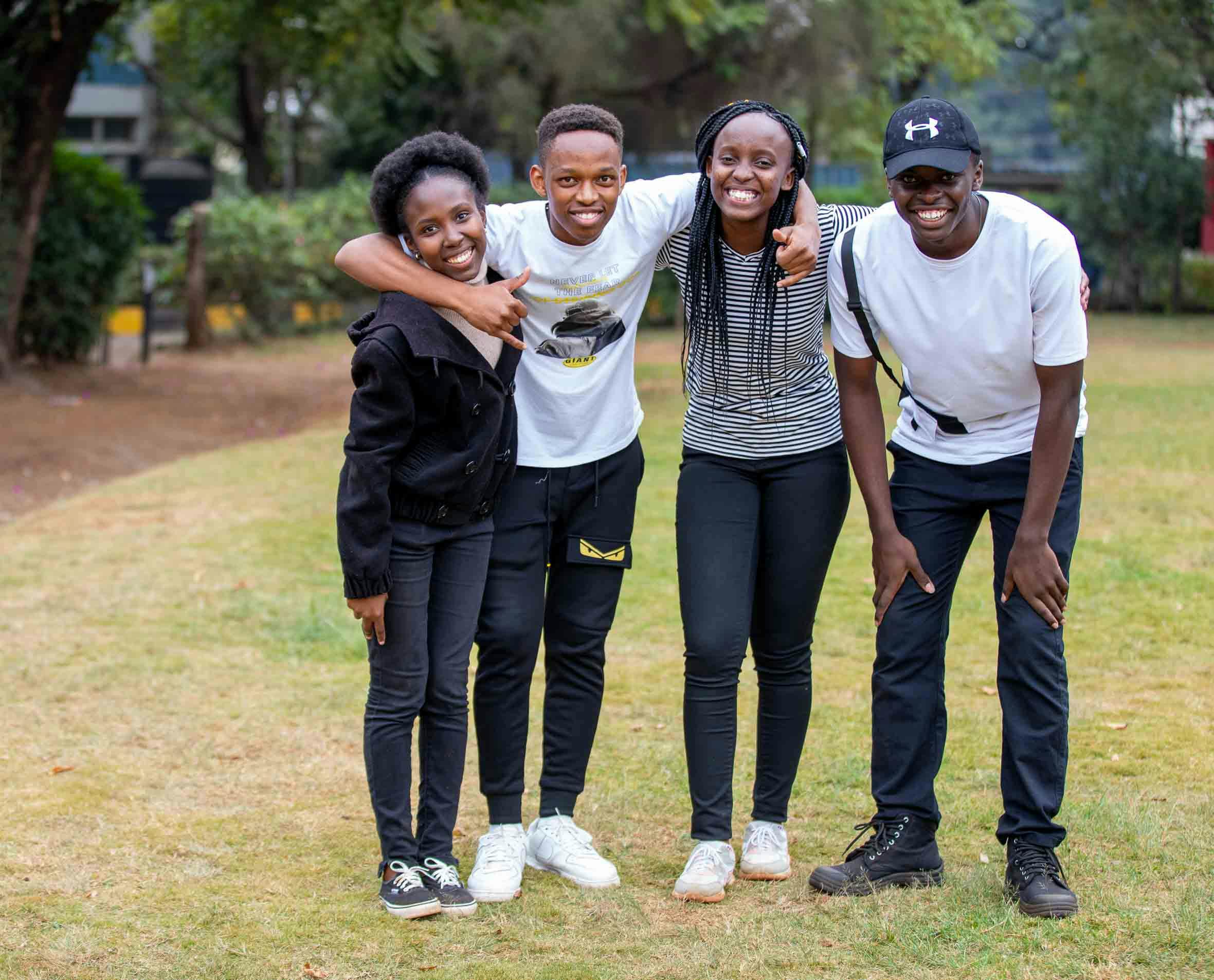 Smiling People Posing to Photo · Free Stock Photo