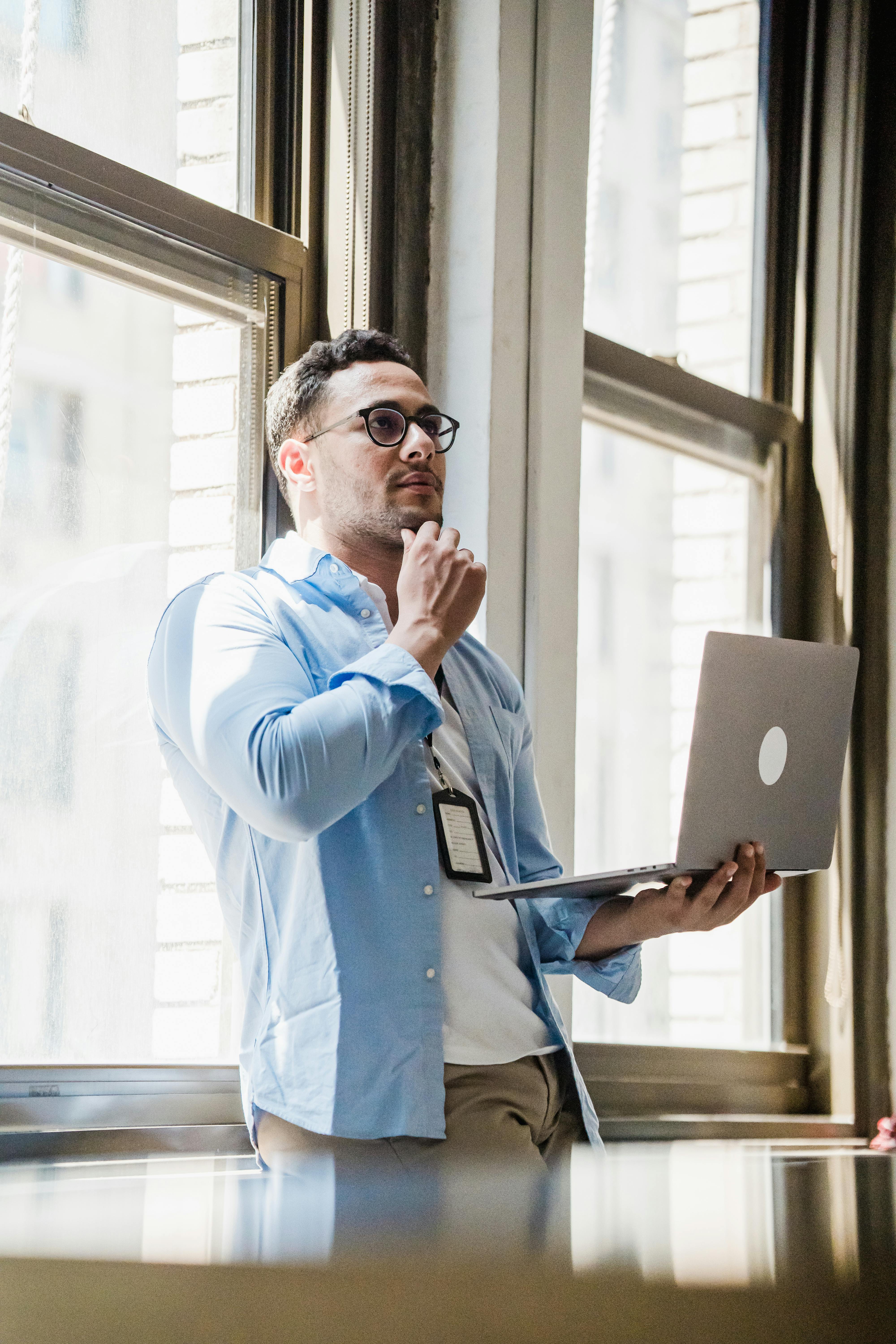 Man Thinking at Work · Free Stock Photo