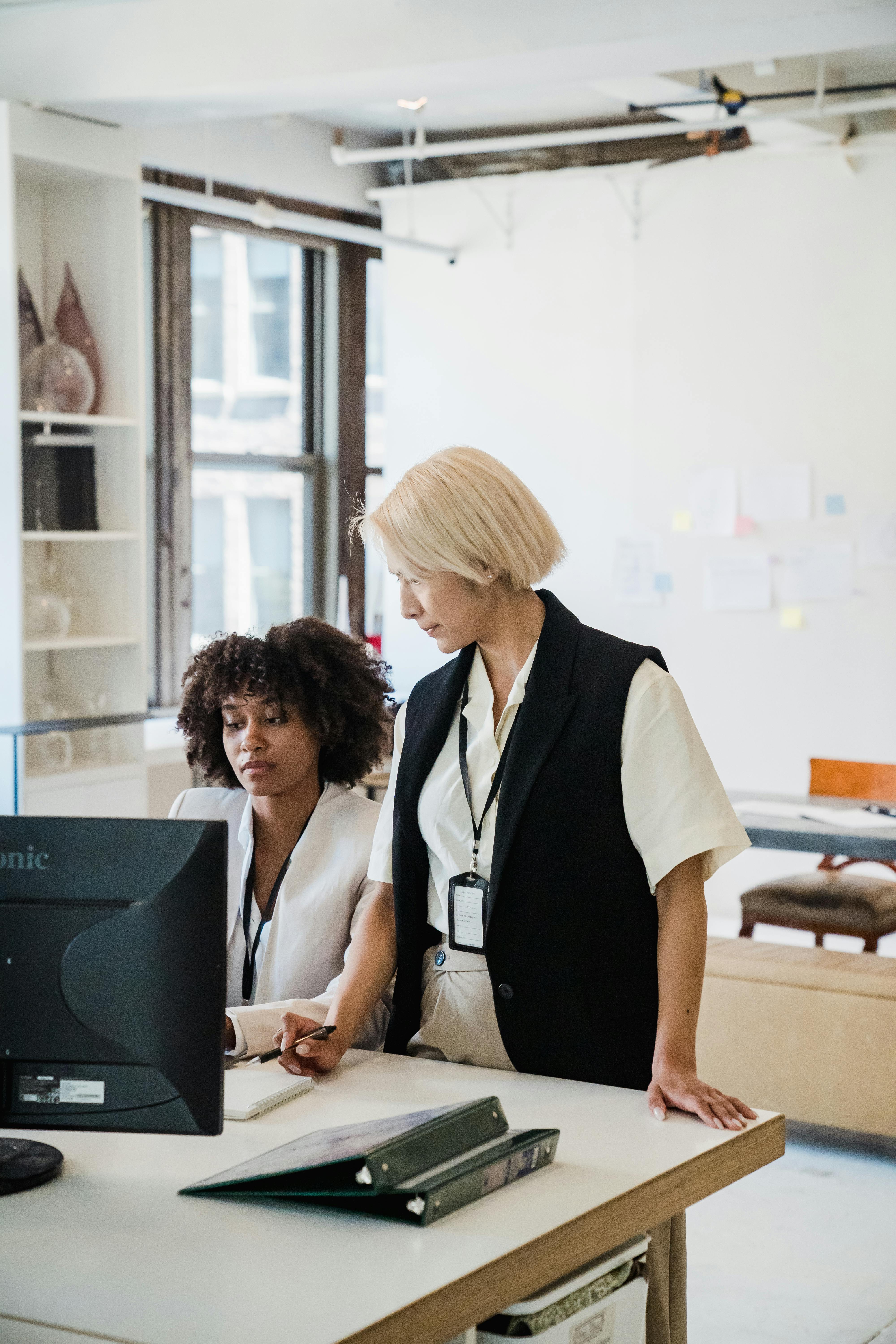 Woman Working on Computer in Office · Free Stock Photo