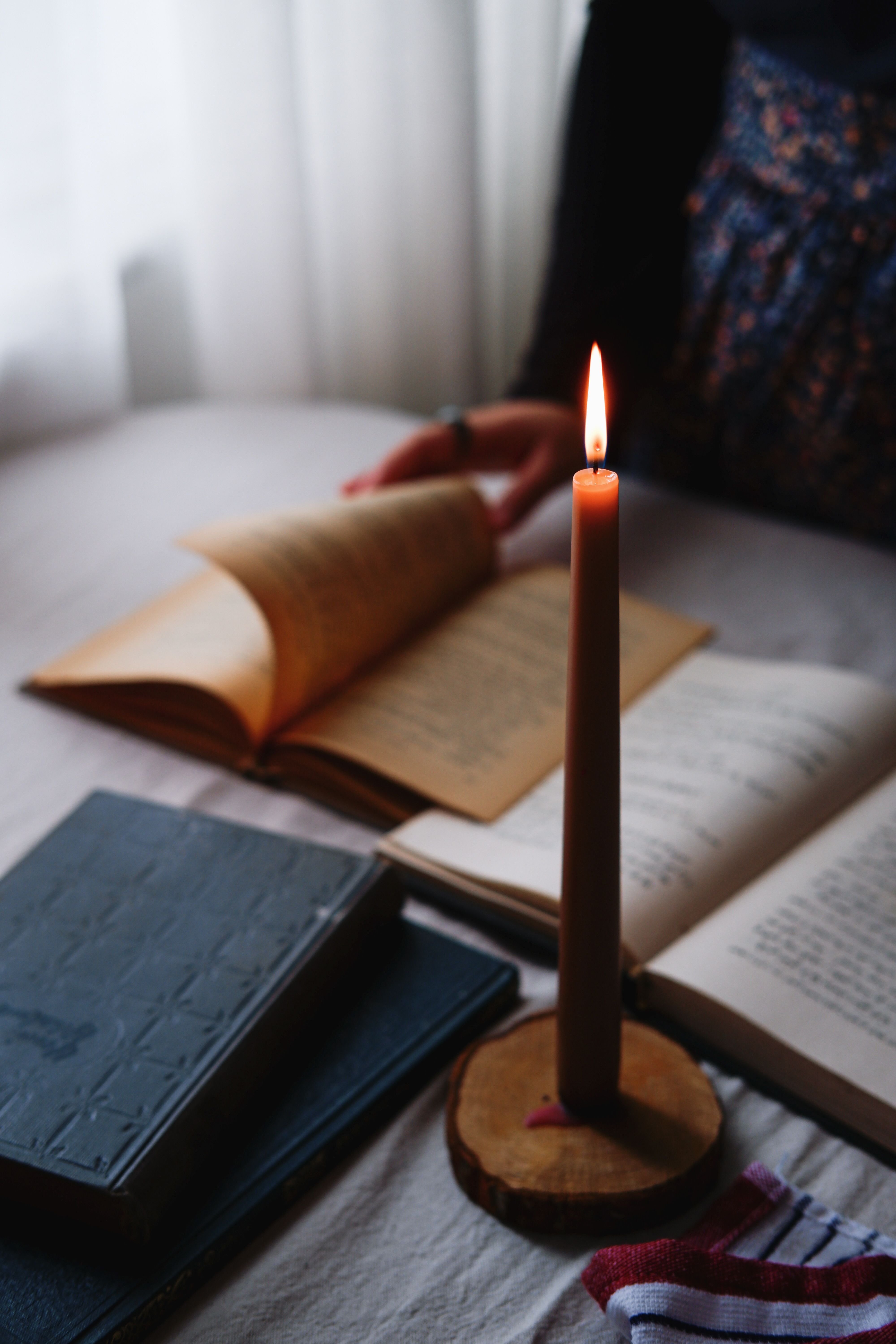 Photo Of Candles On Top Of Books · Free Stock Photo