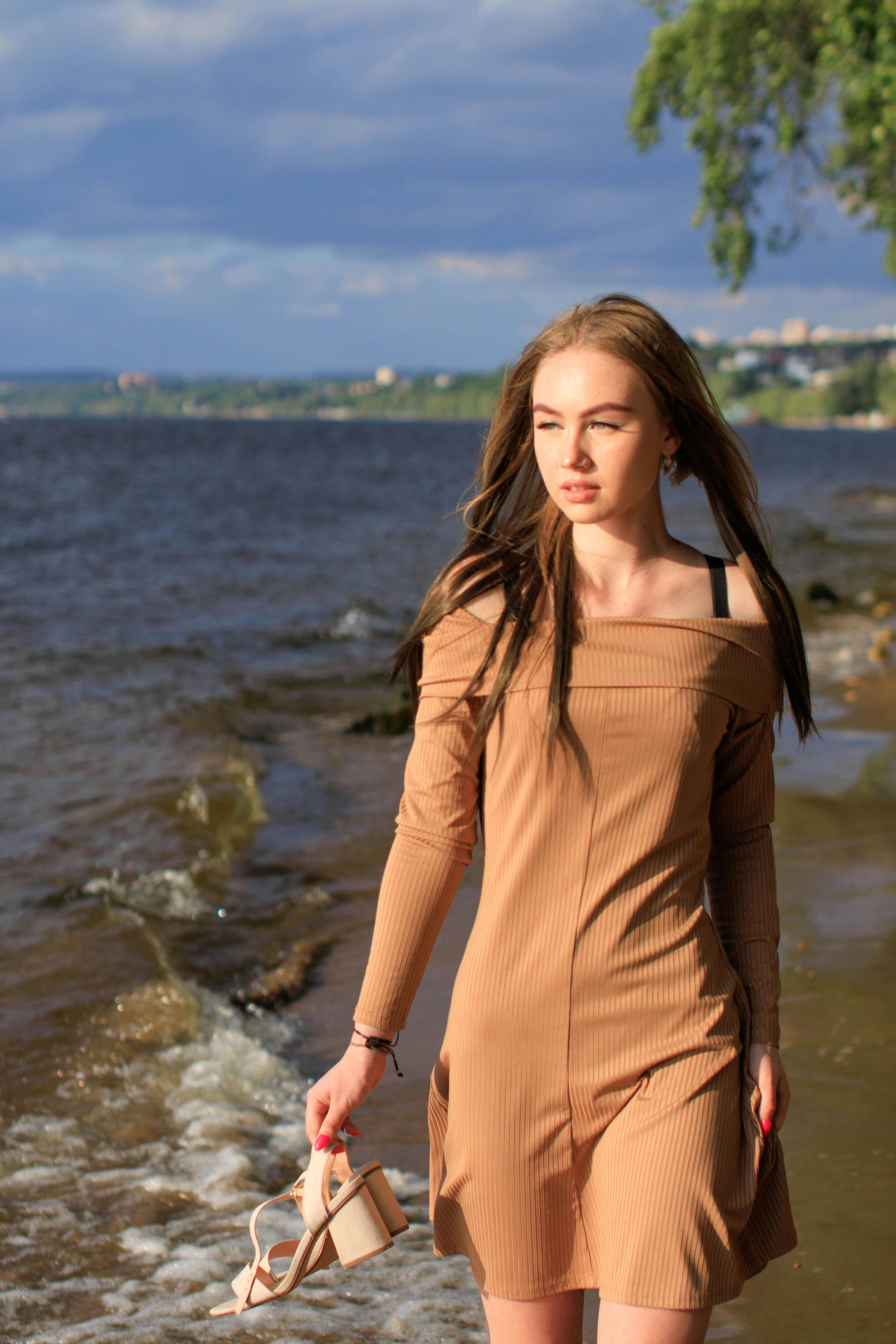Woman Wearing an Off Shoulder Dress · Free Stock Photo