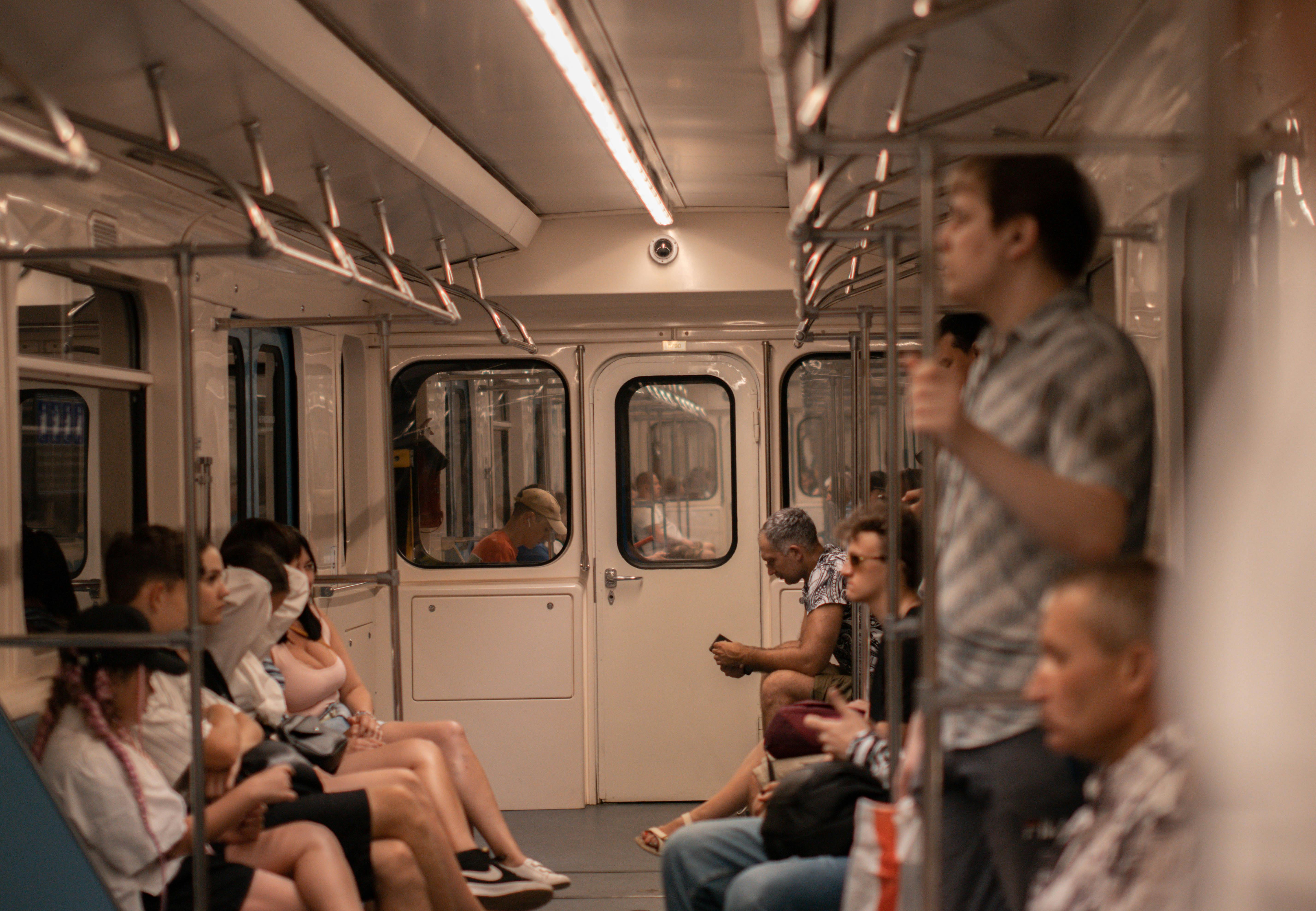 Group of People in Train · Free Stock Photo