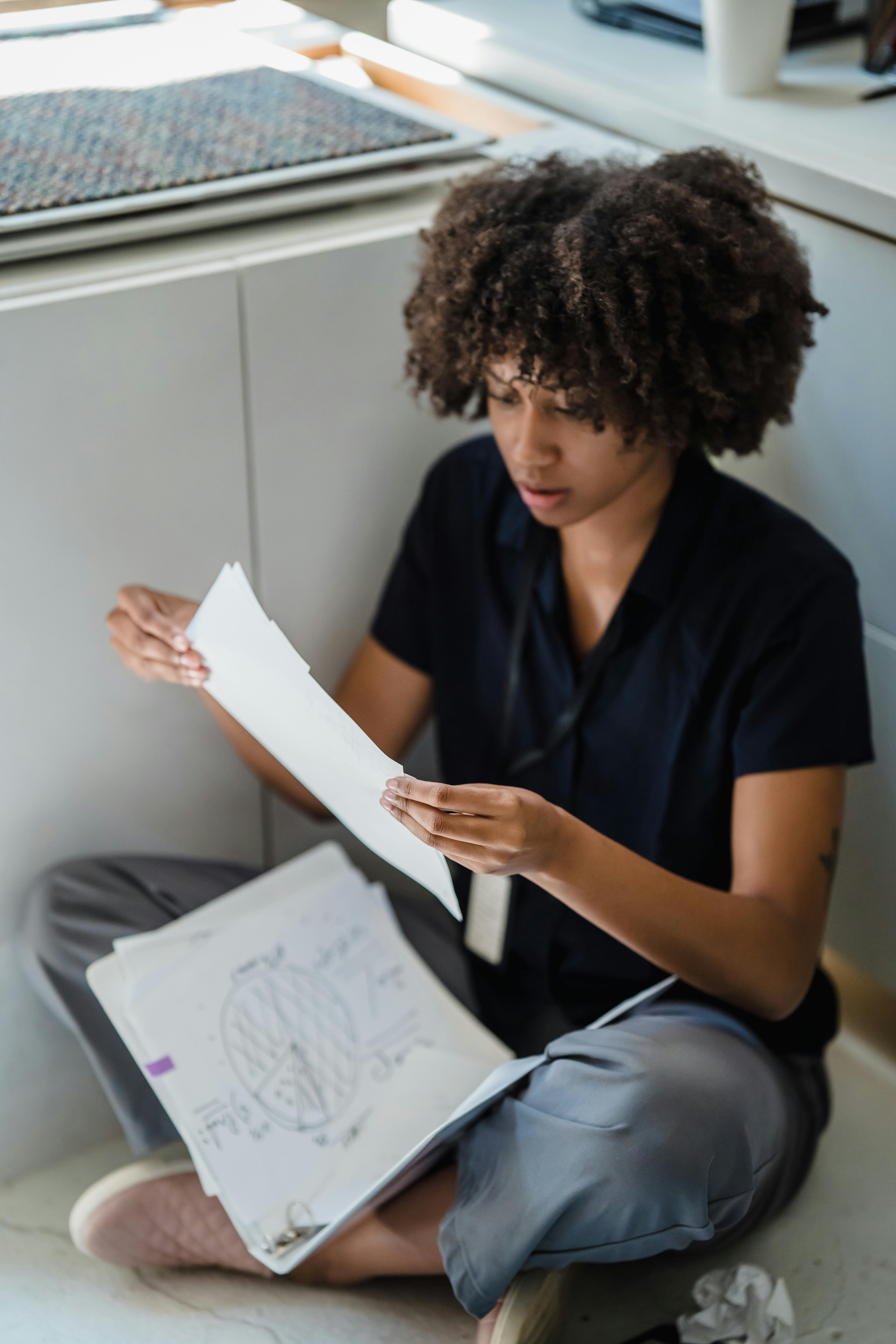 Woman Working With Documents in Office · Free Stock Photo