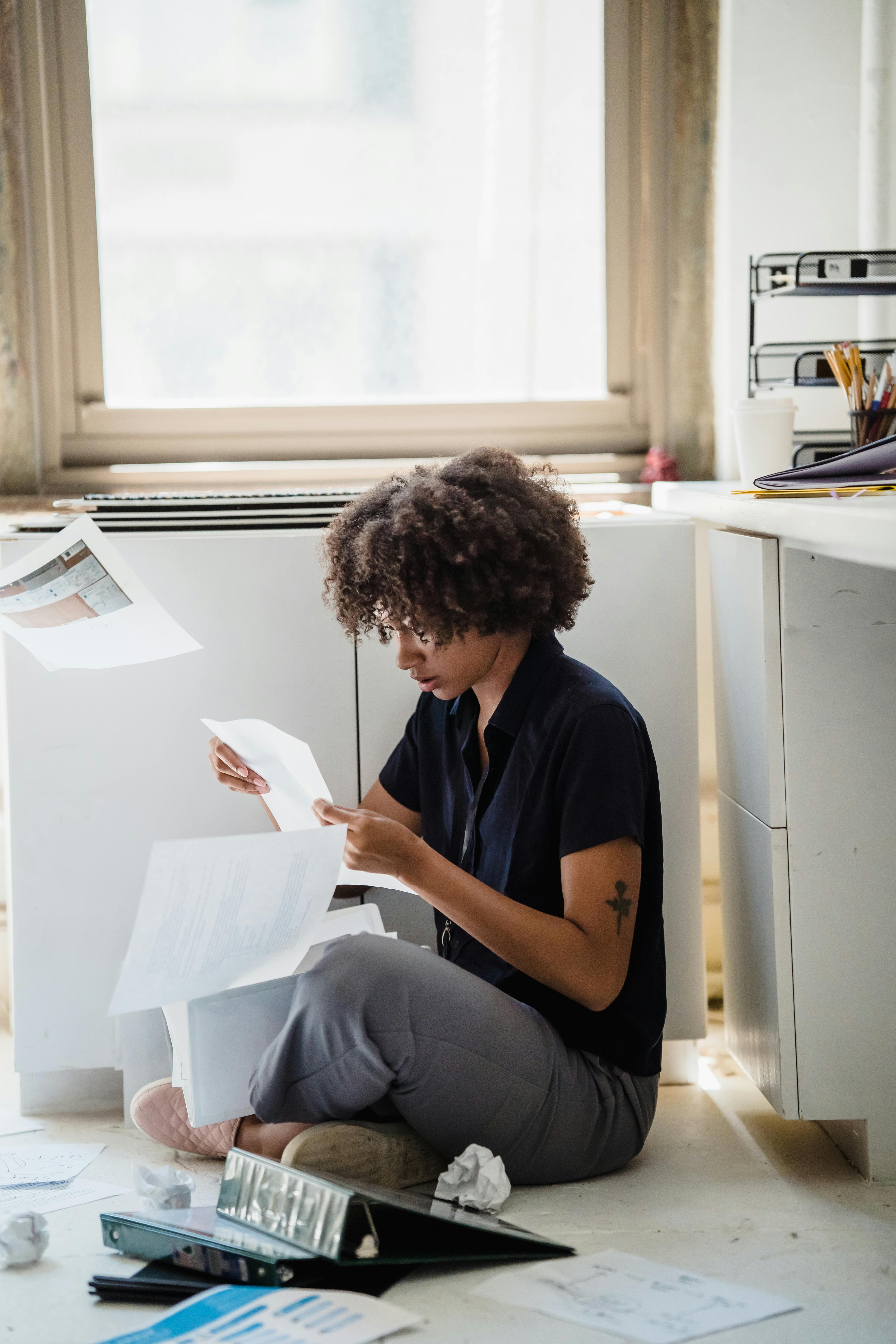 Woman Working With Documents in Office · Free Stock Photo