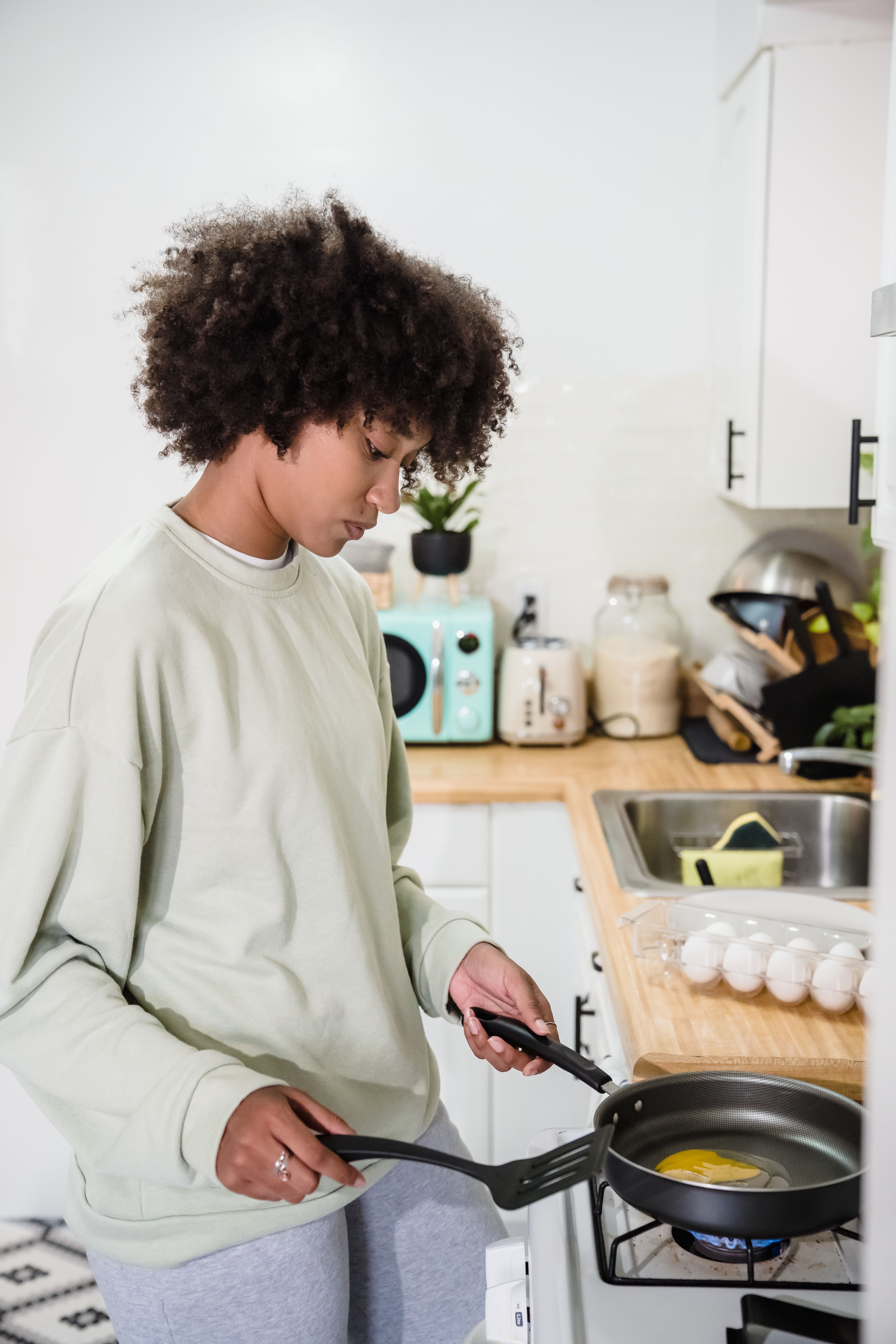 Portrait of a Woman Cooking · Free Stock Photo