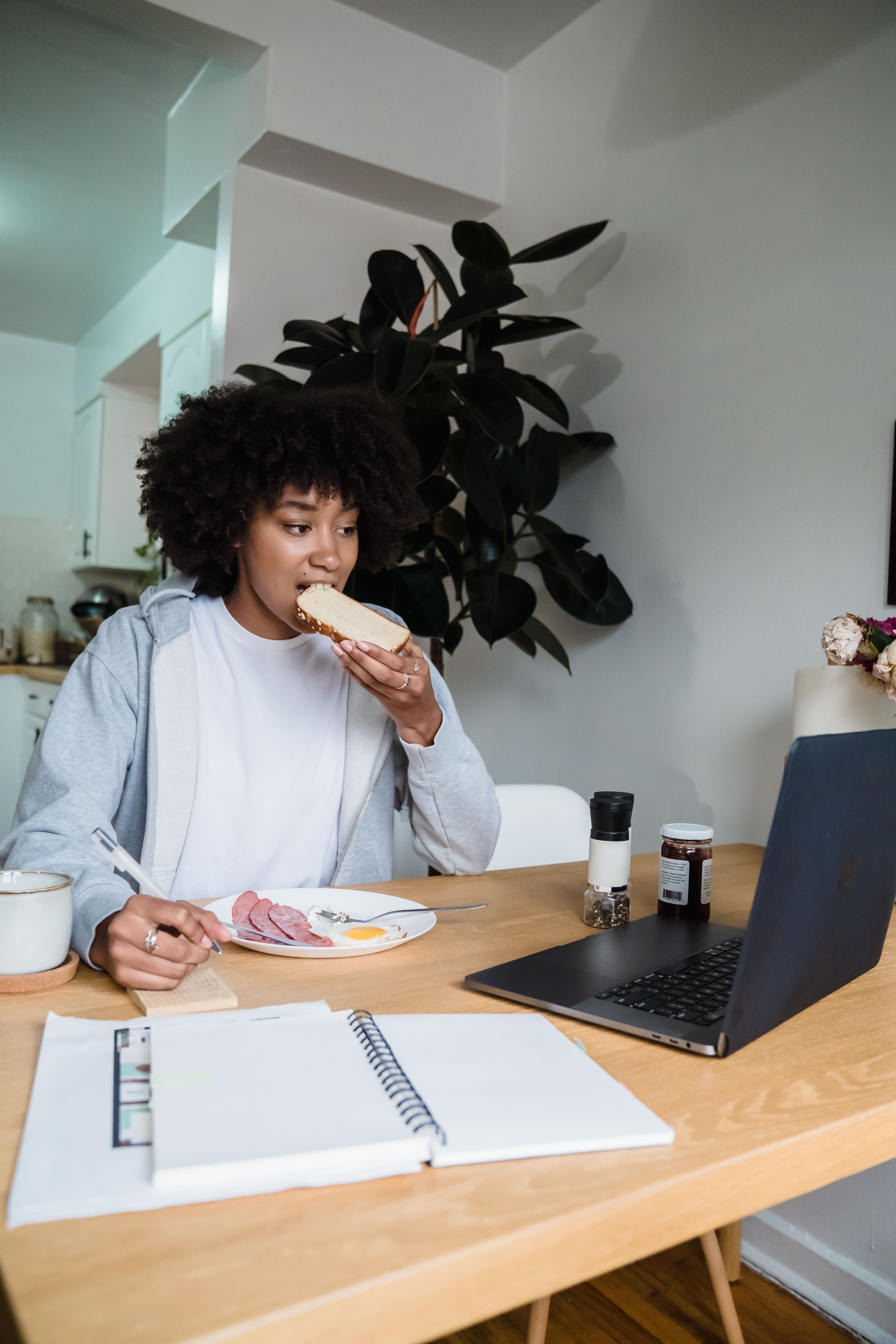 A Woman Eating Her Breakfast · Free Stock Photo