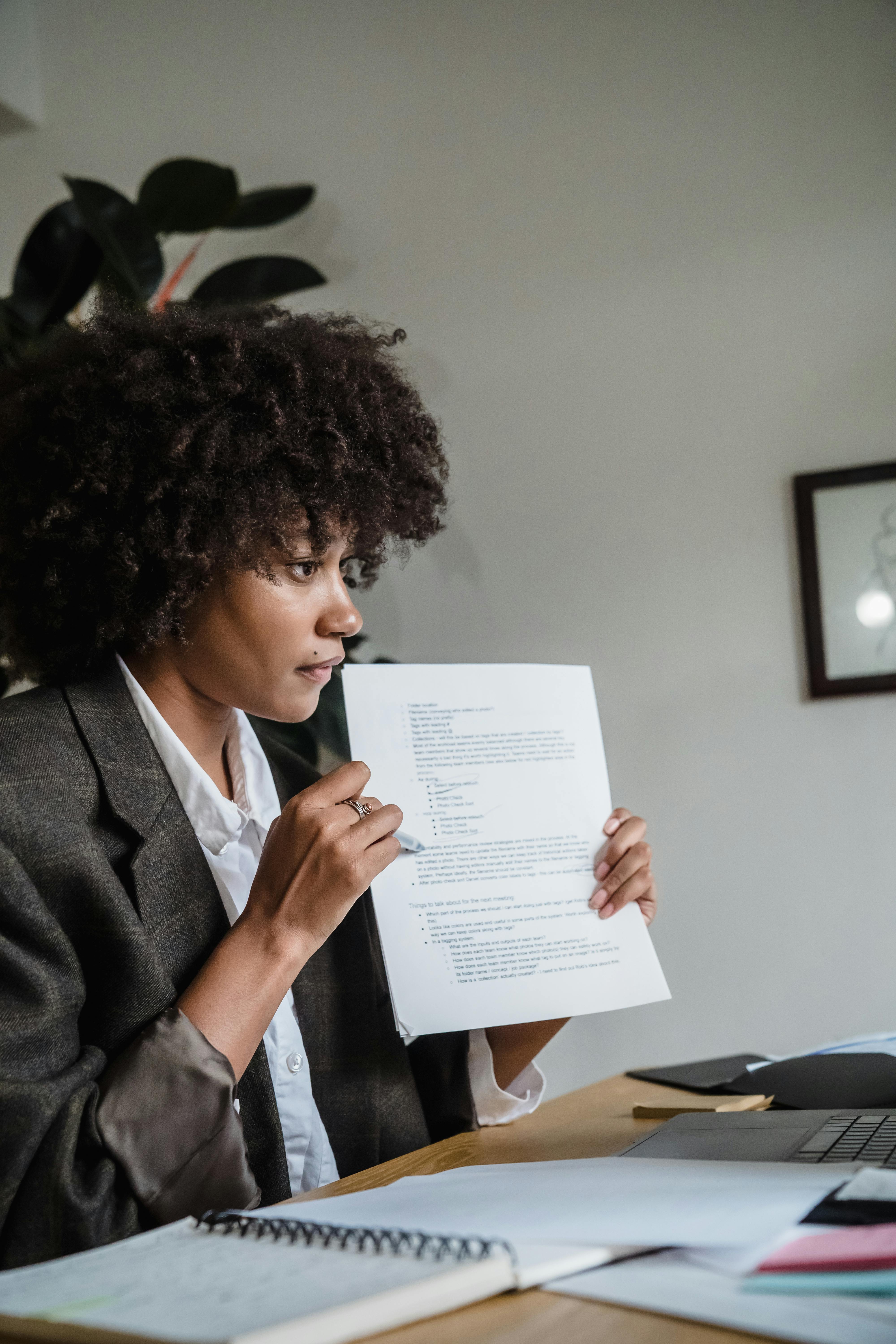 Woman Showing Documents at Work · Free Stock Photo