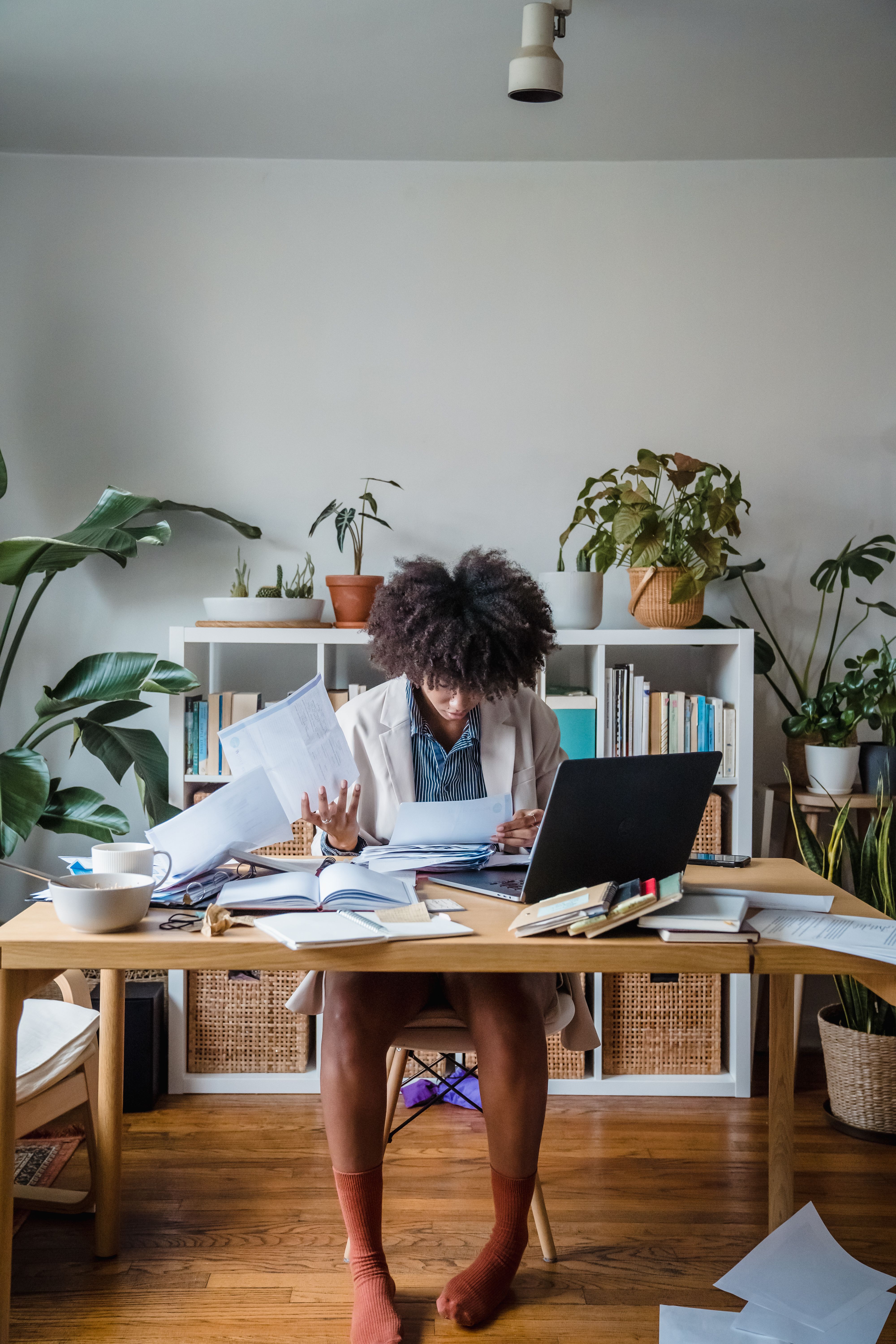 Busy Woman Working Remotely · Free Stock Photo