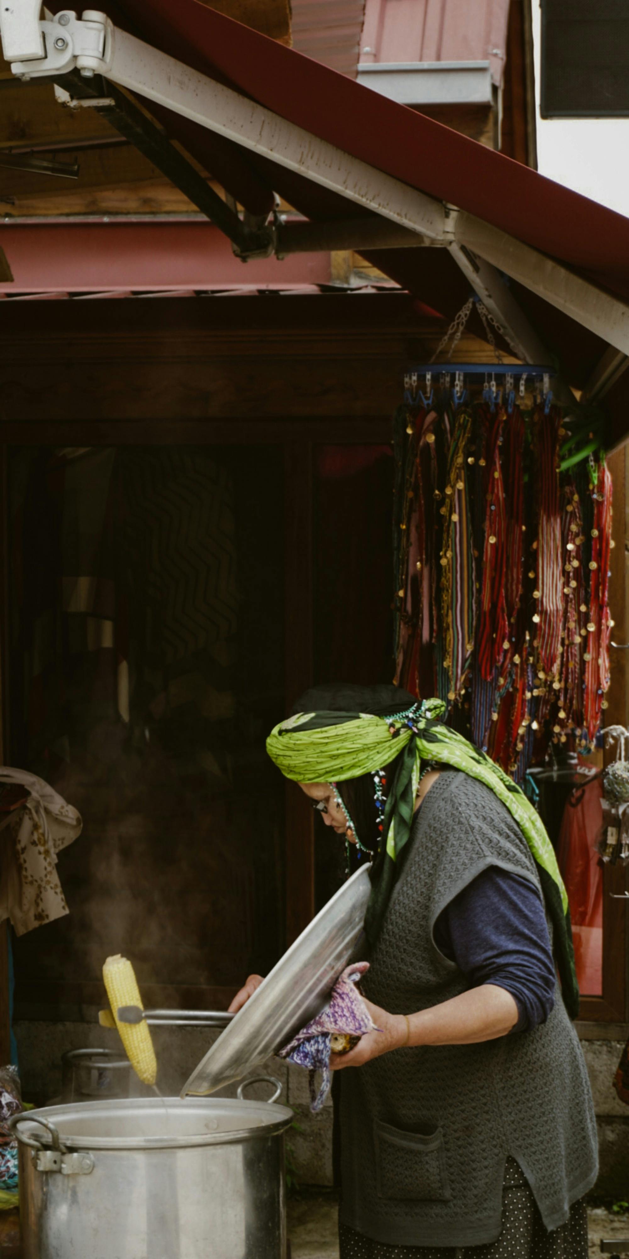 Woman Standing by Cauldron and Cooking · Free Stock Photo