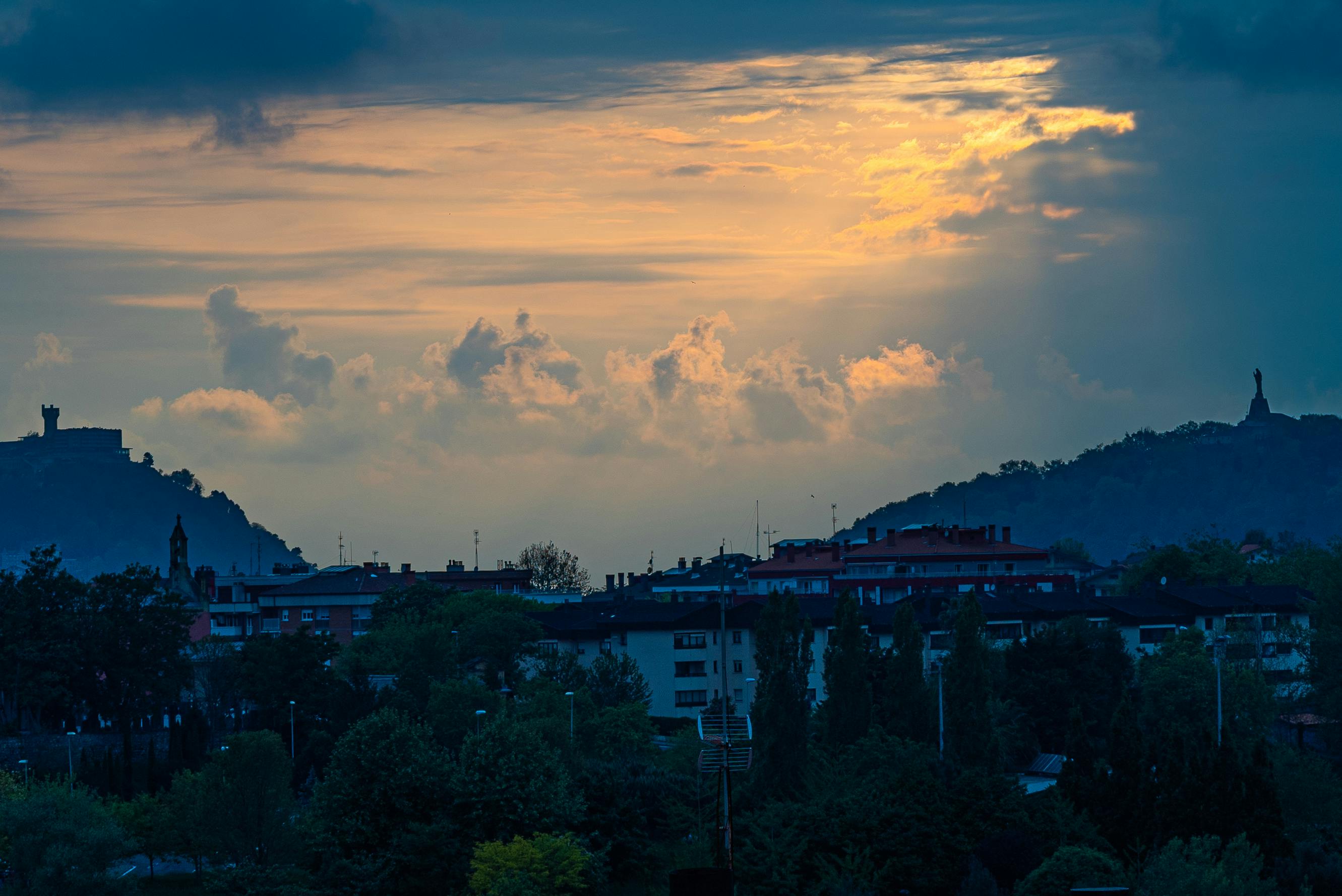 Town at Dusk and Clouds in Sky · Free Stock Photo