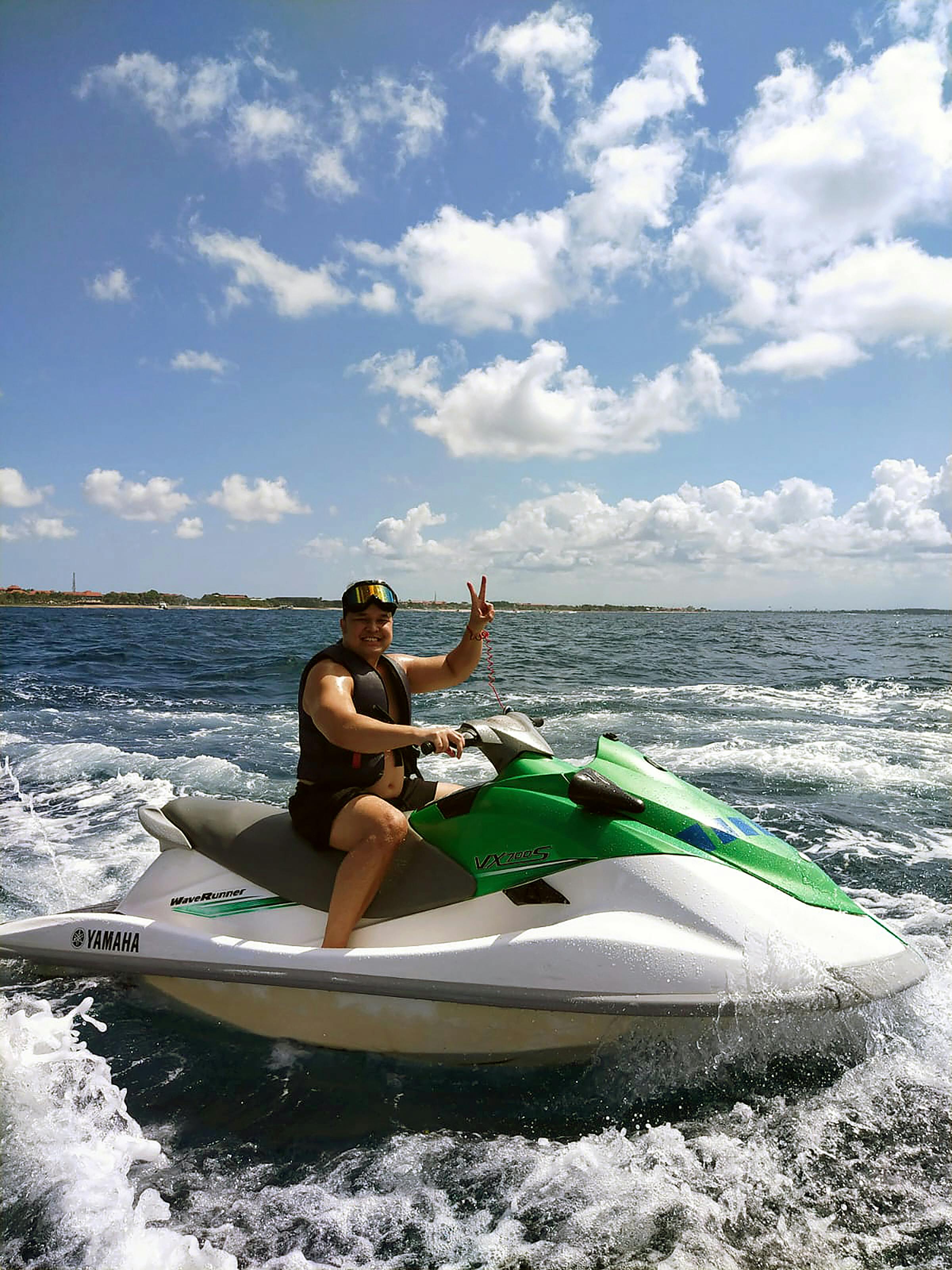 Two People Riding On Jet Ski · Free Stock Photo