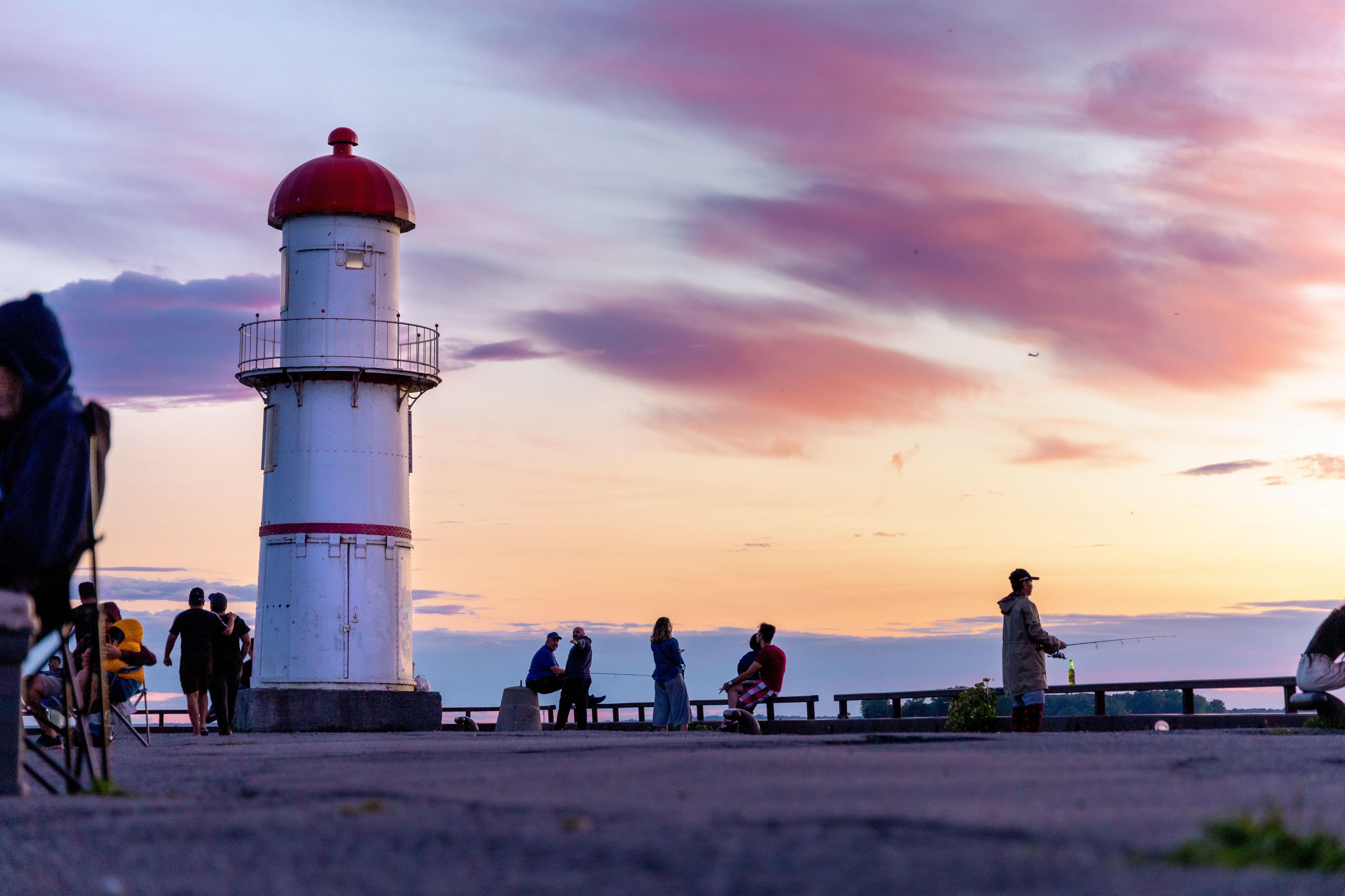 Photograph of People Near a Lighthouse · Free Stock Photo