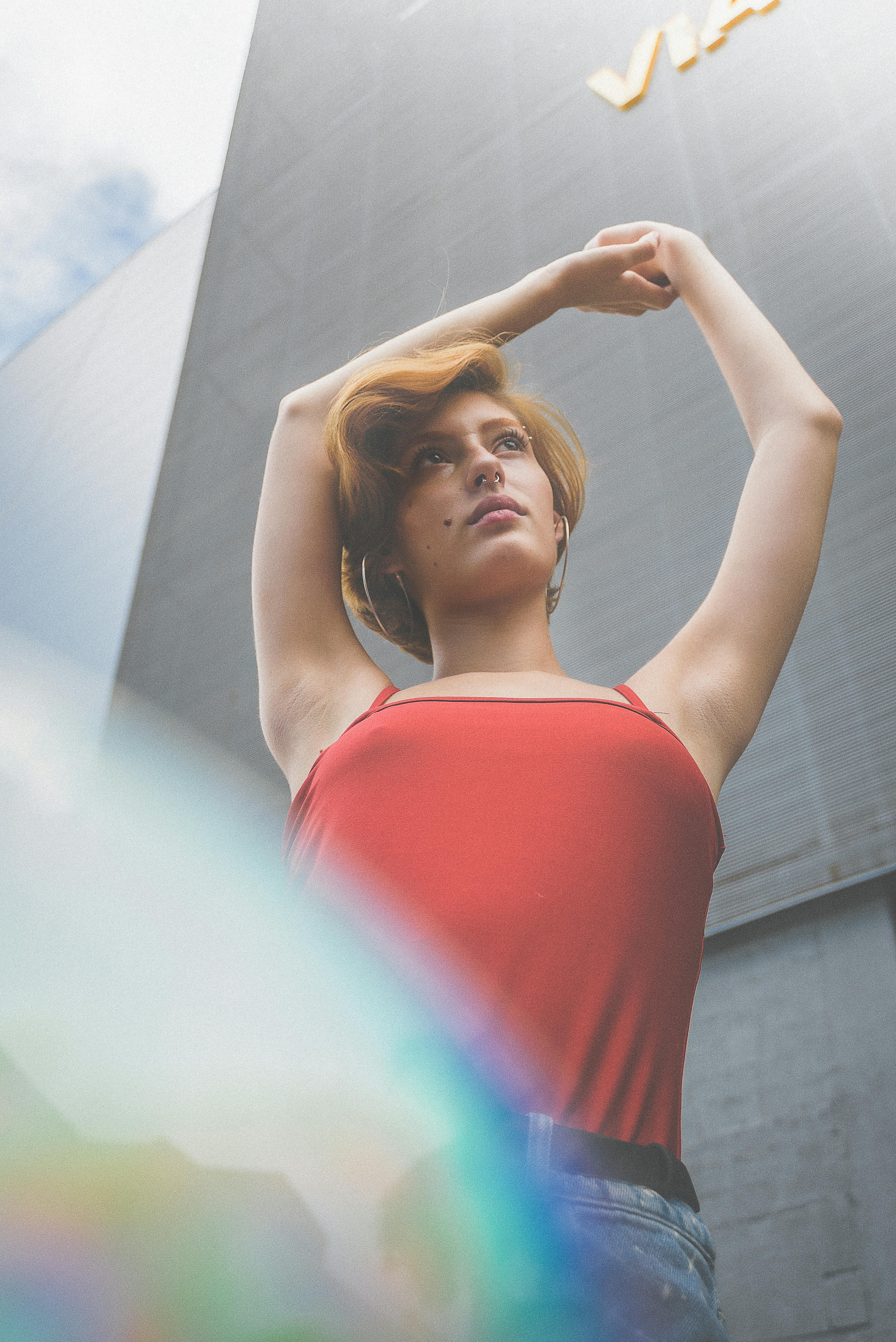 A Woman in Red Spaghetti Strap Top · Free Stock Photo