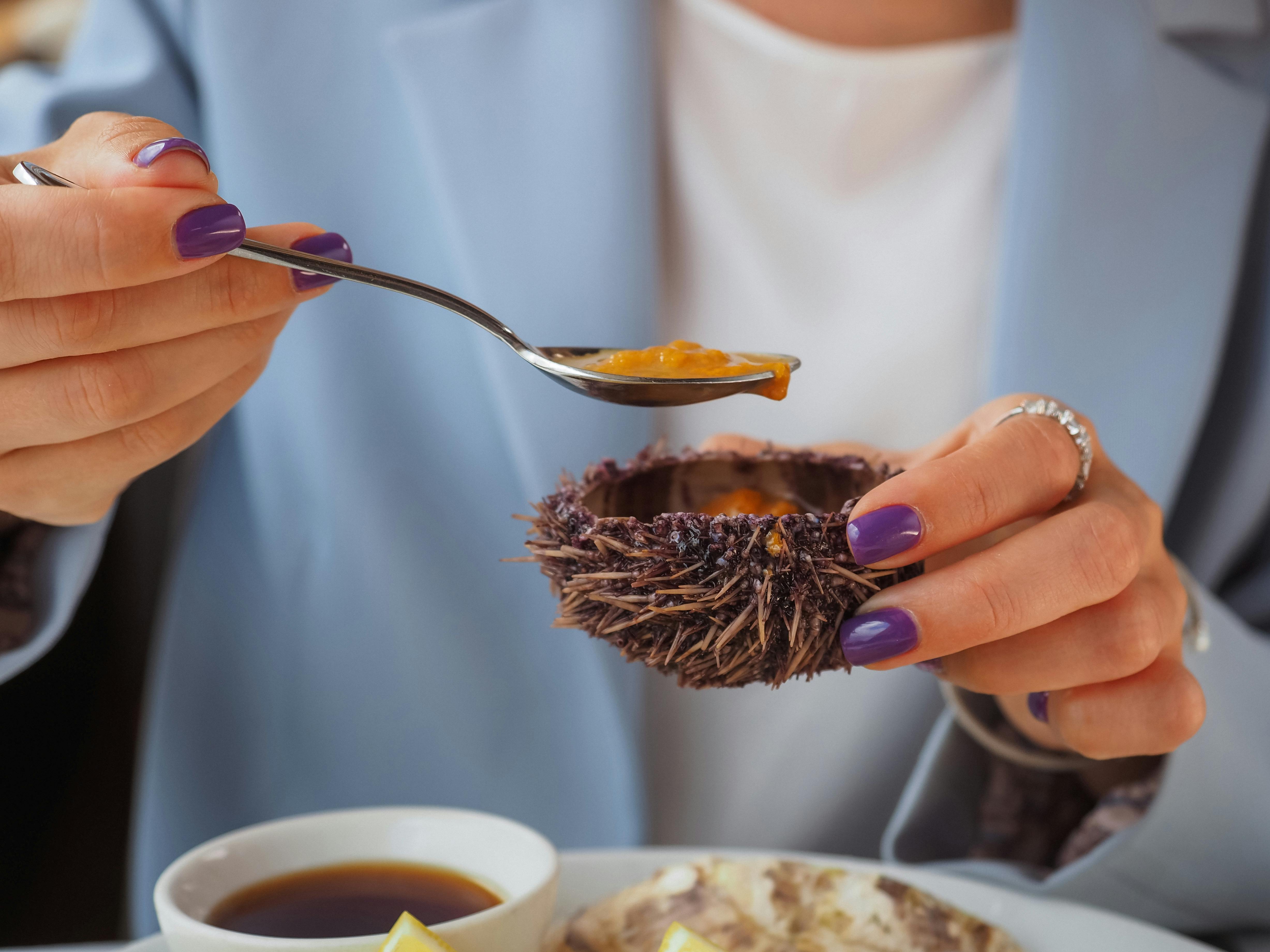 Woman Eating Food with Spoon · Free Stock Photo