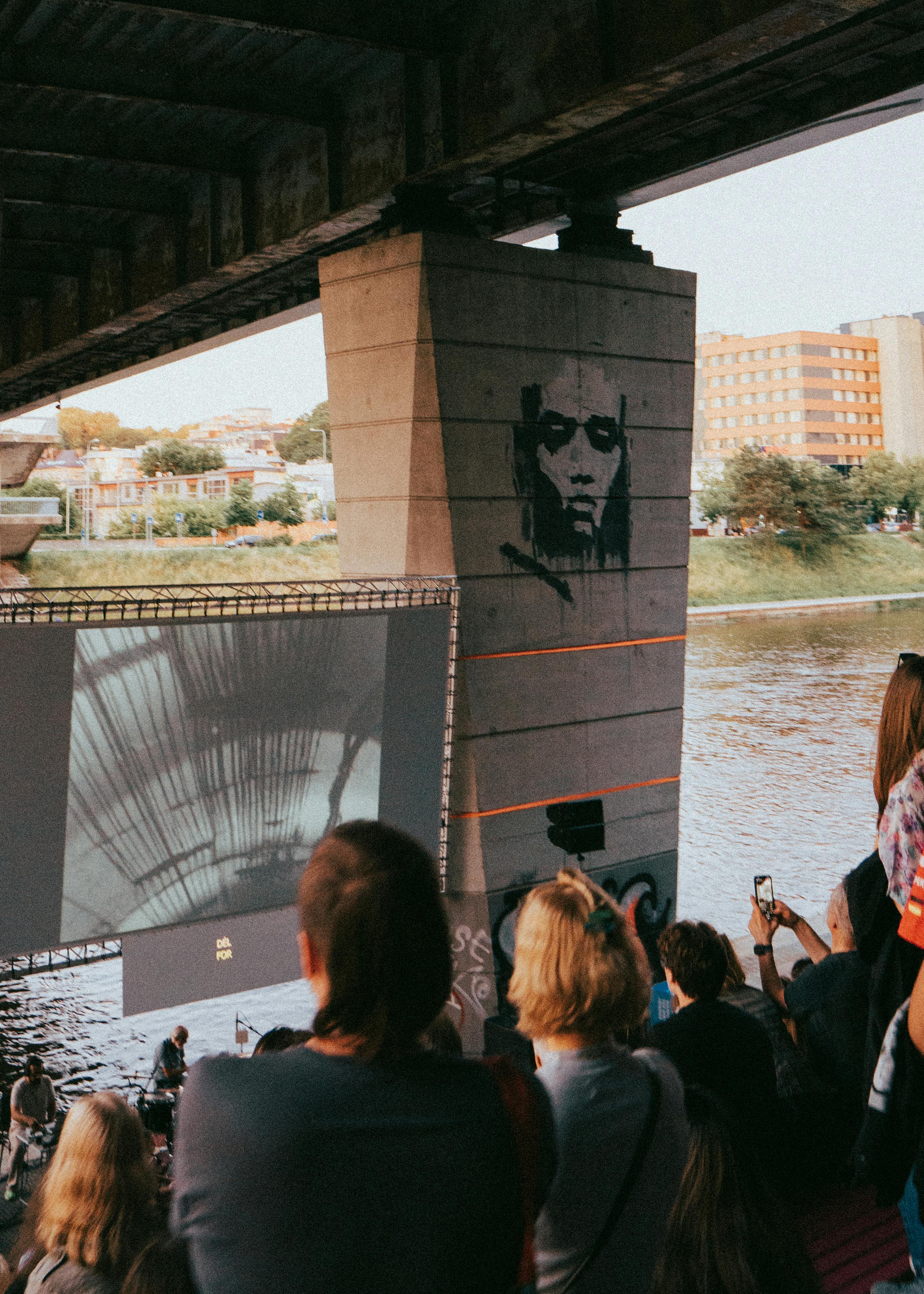 People Standing Under the Bridge · Free Stock Photo