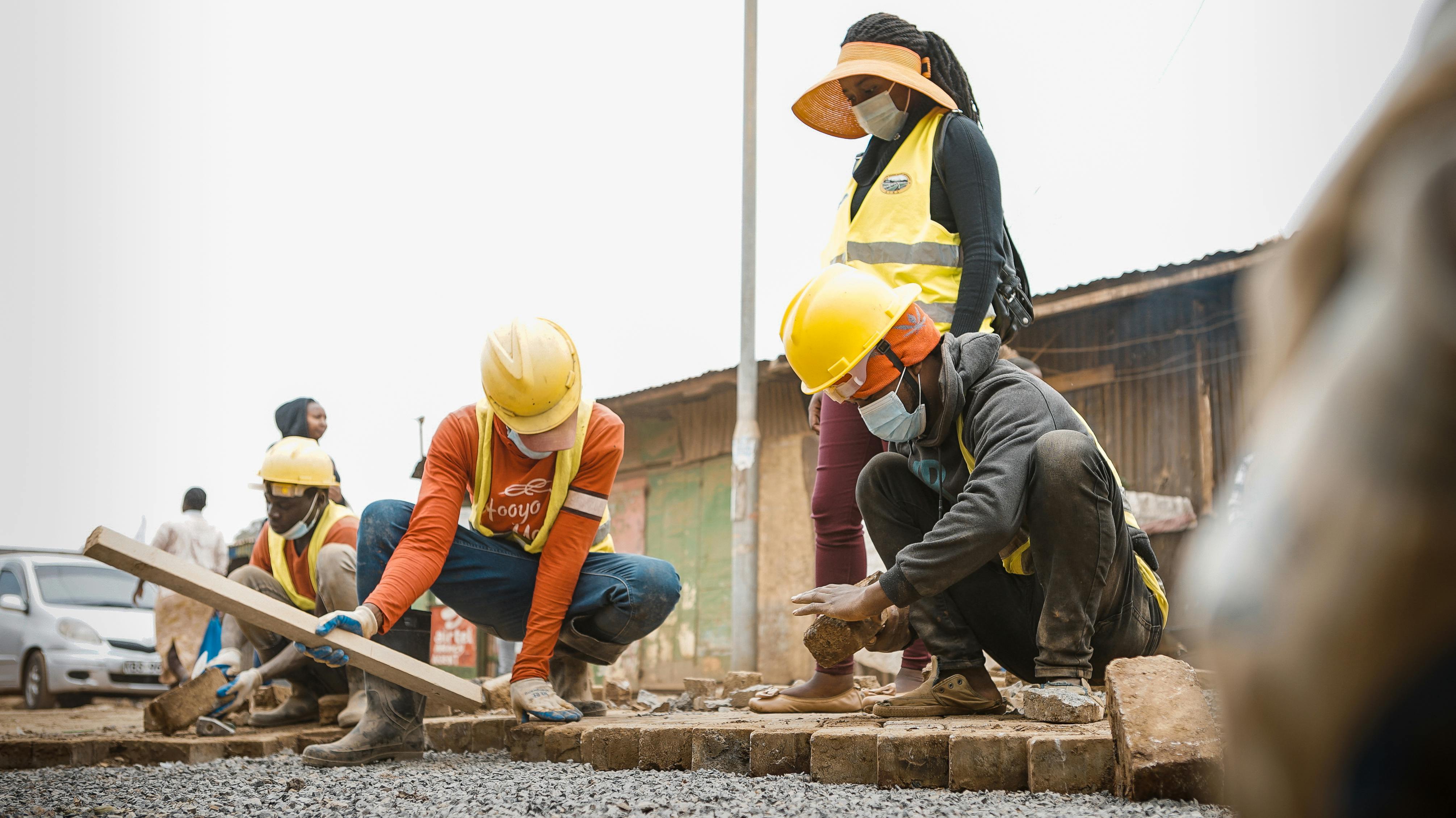 Construction Workers on the Street · Free Stock Photo