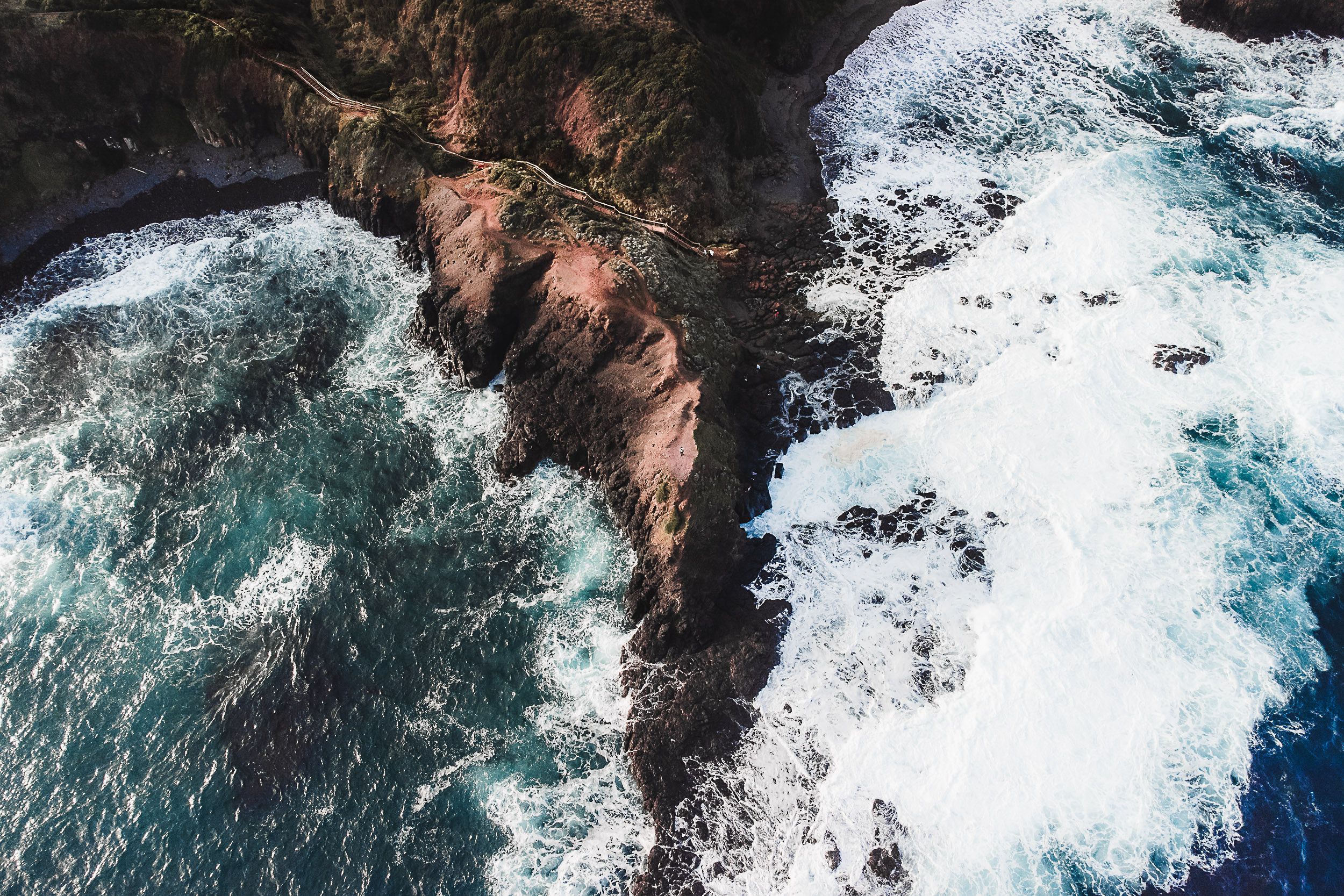 Cliffs along Disturbed Sea · Free Stock Photo