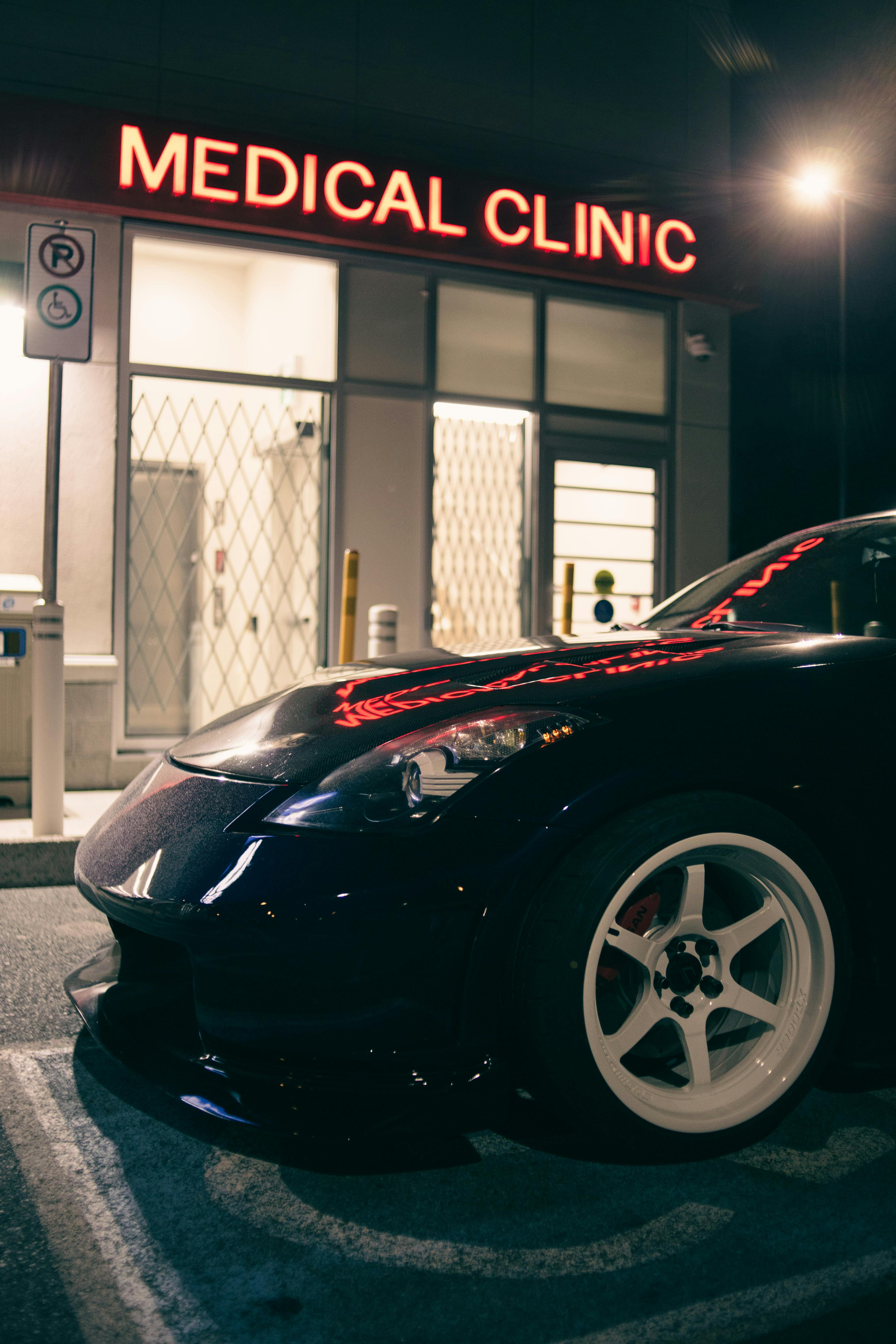 Black Nissan 370z in City at Night · Free Stock Photo