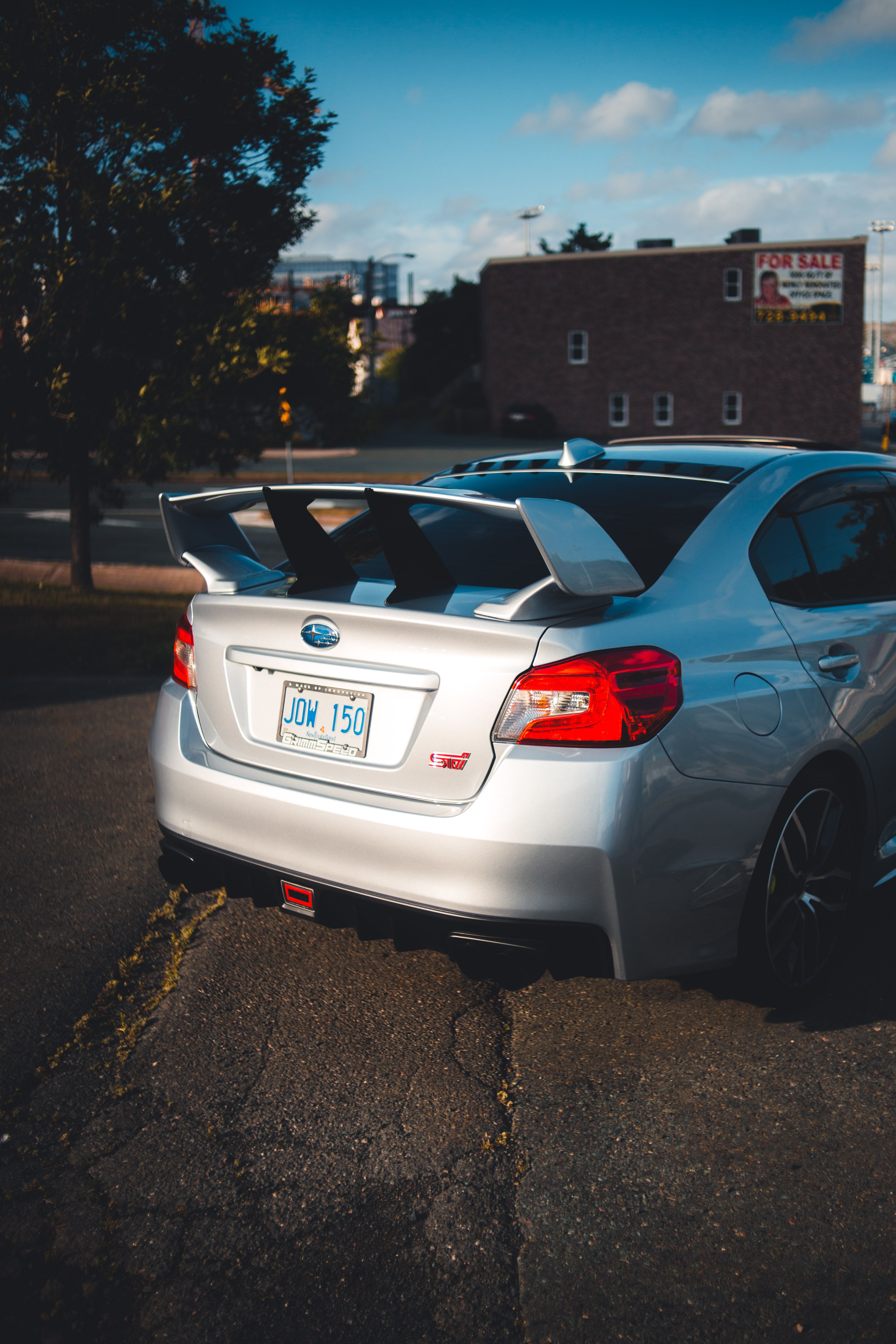 Shiny Sports Car with Spoiler · Free Stock Photo