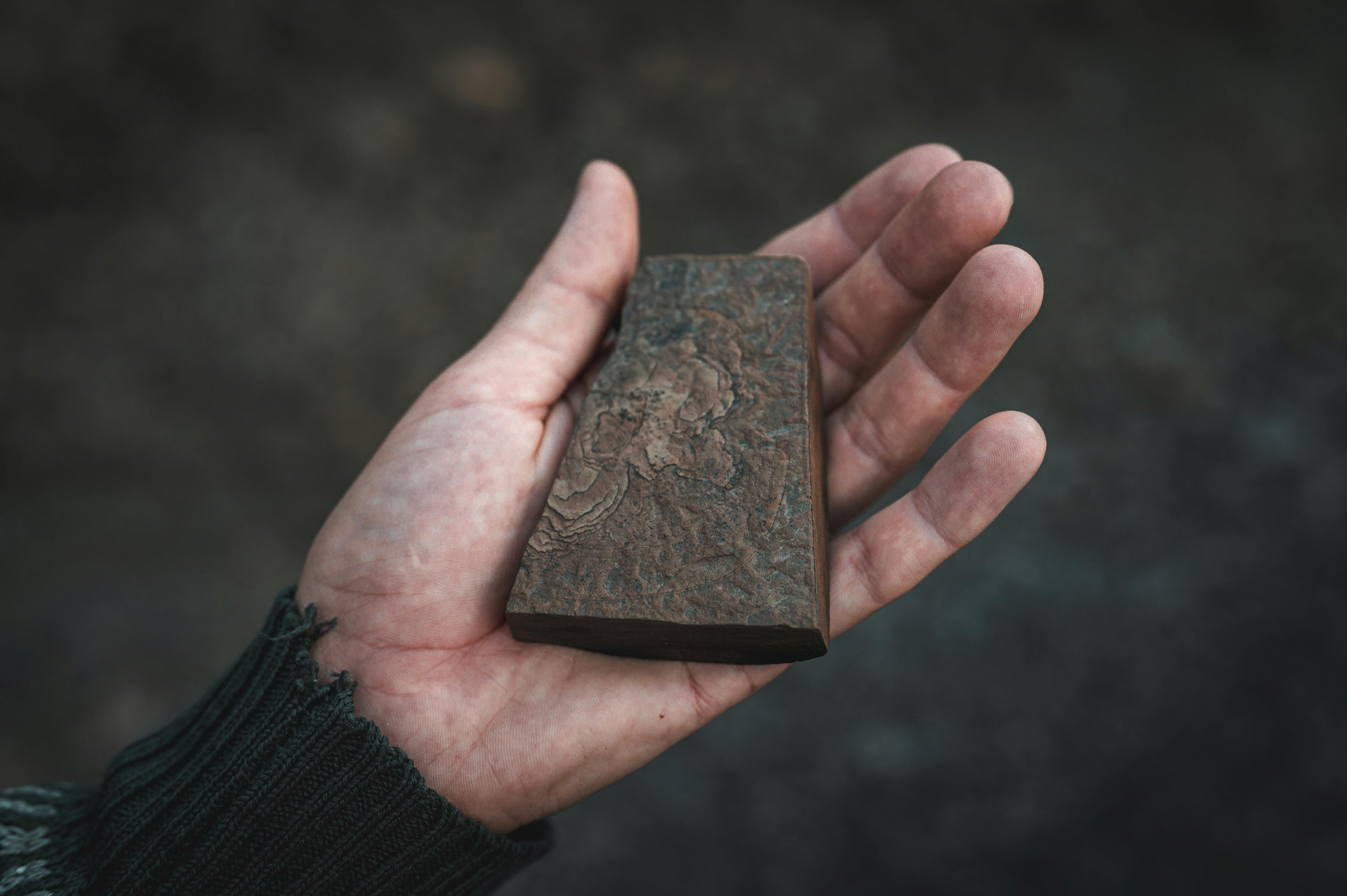 Man Holding Rock · Free Stock Photo