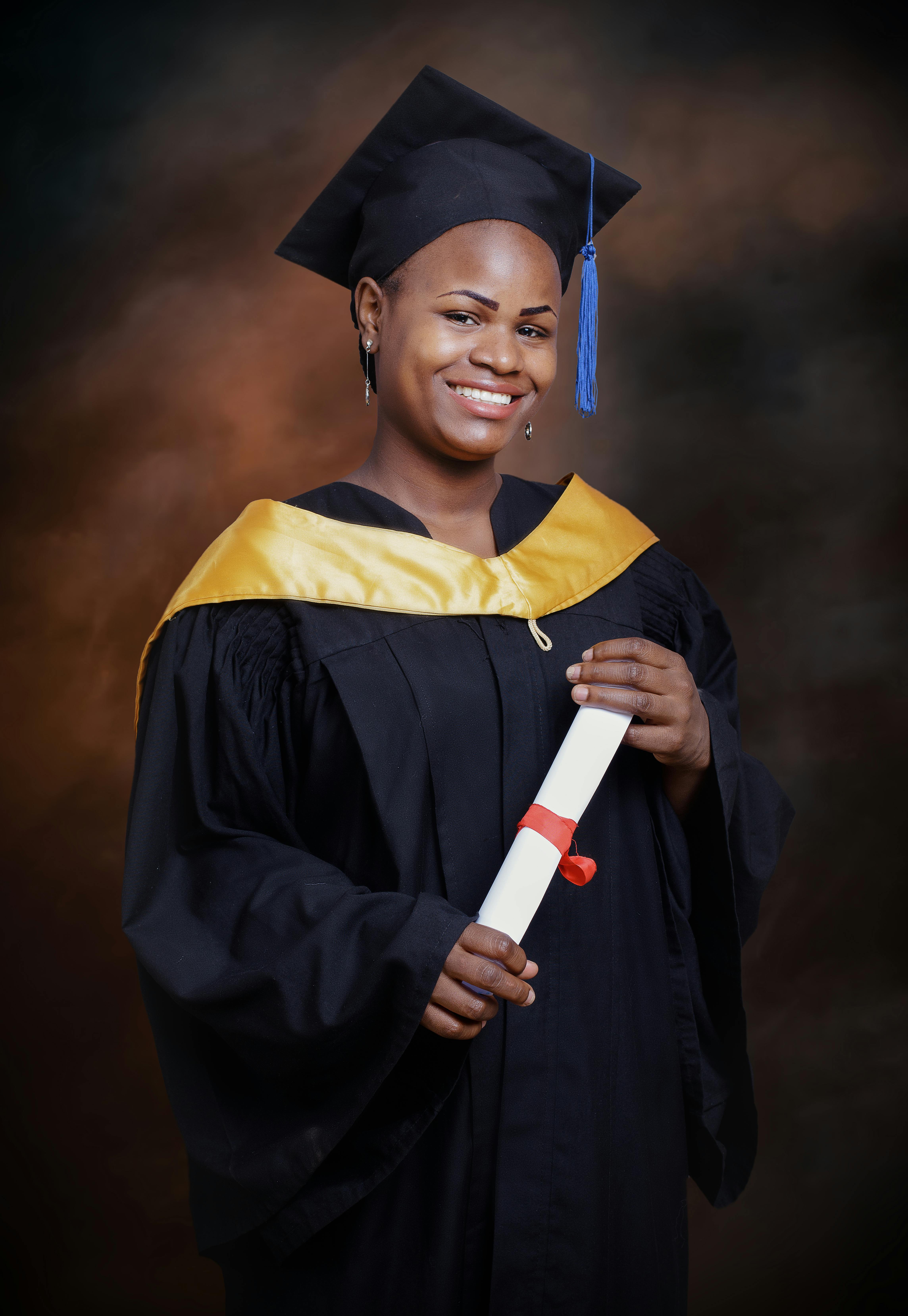 Woman in Graduation Gown · Free Stock Photo