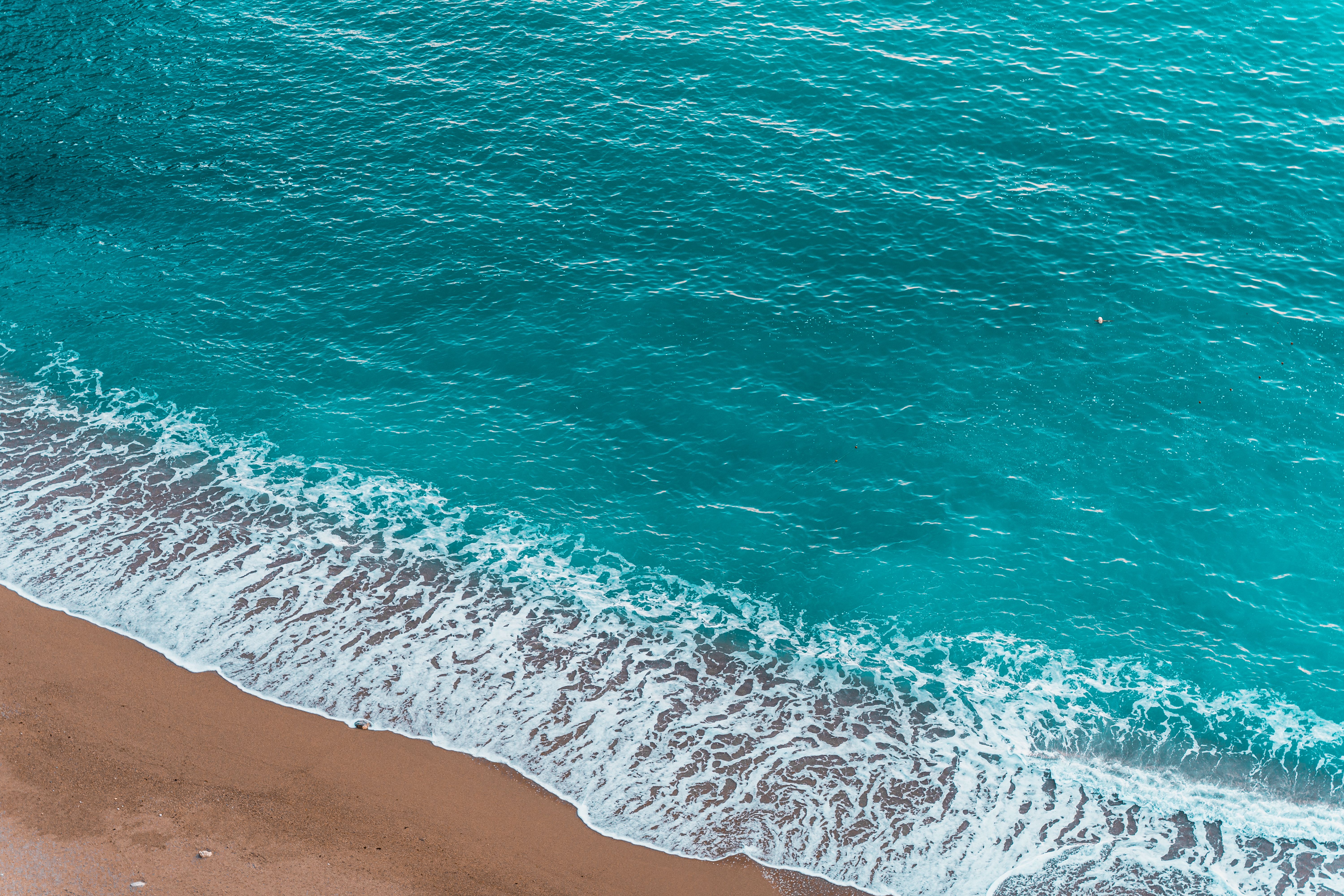 Aerial Shot of Blue Water at the Beach · Free Stock Photo
