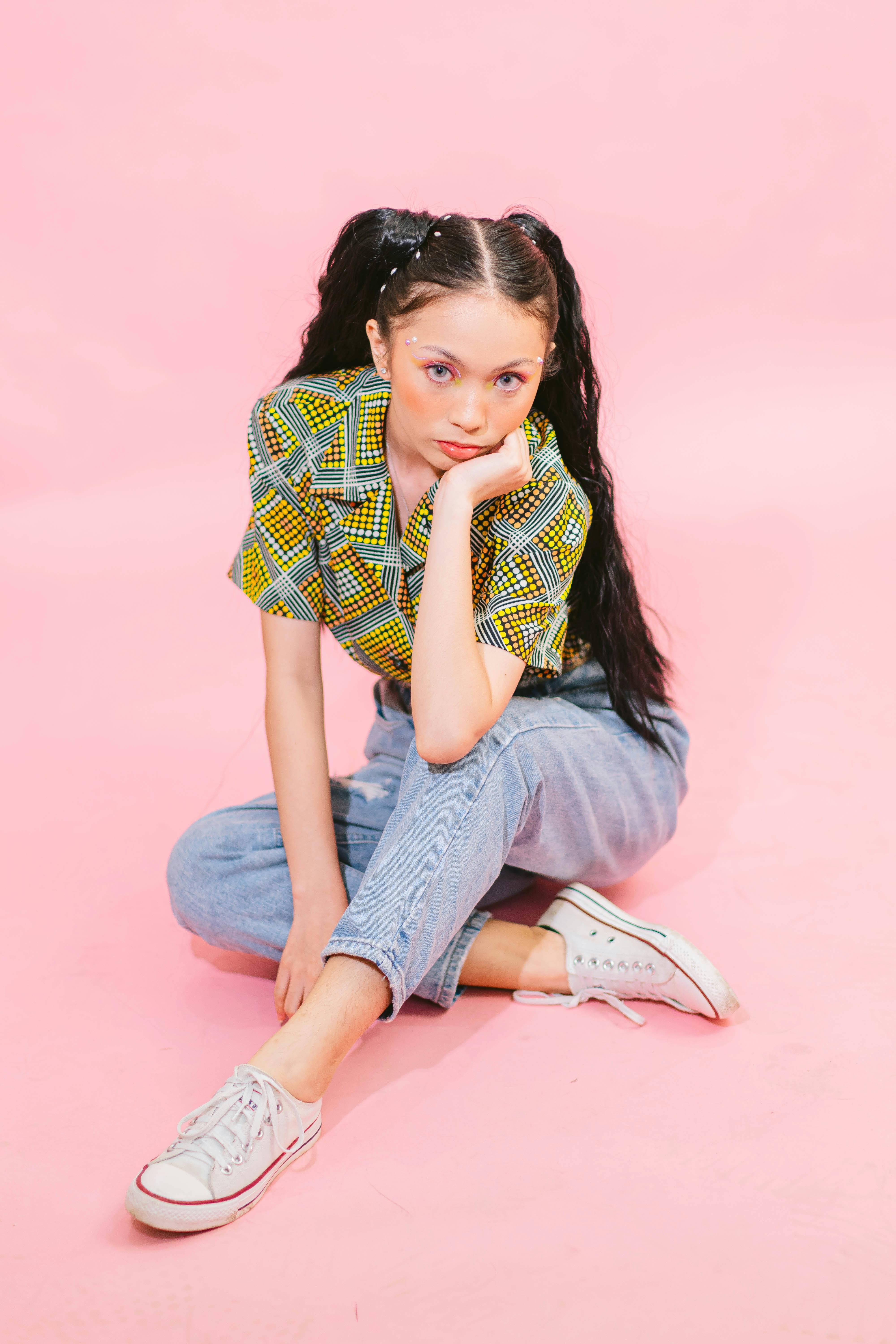 Girl in Casual Clothes on Pink Studio Background · Free Stock Photo