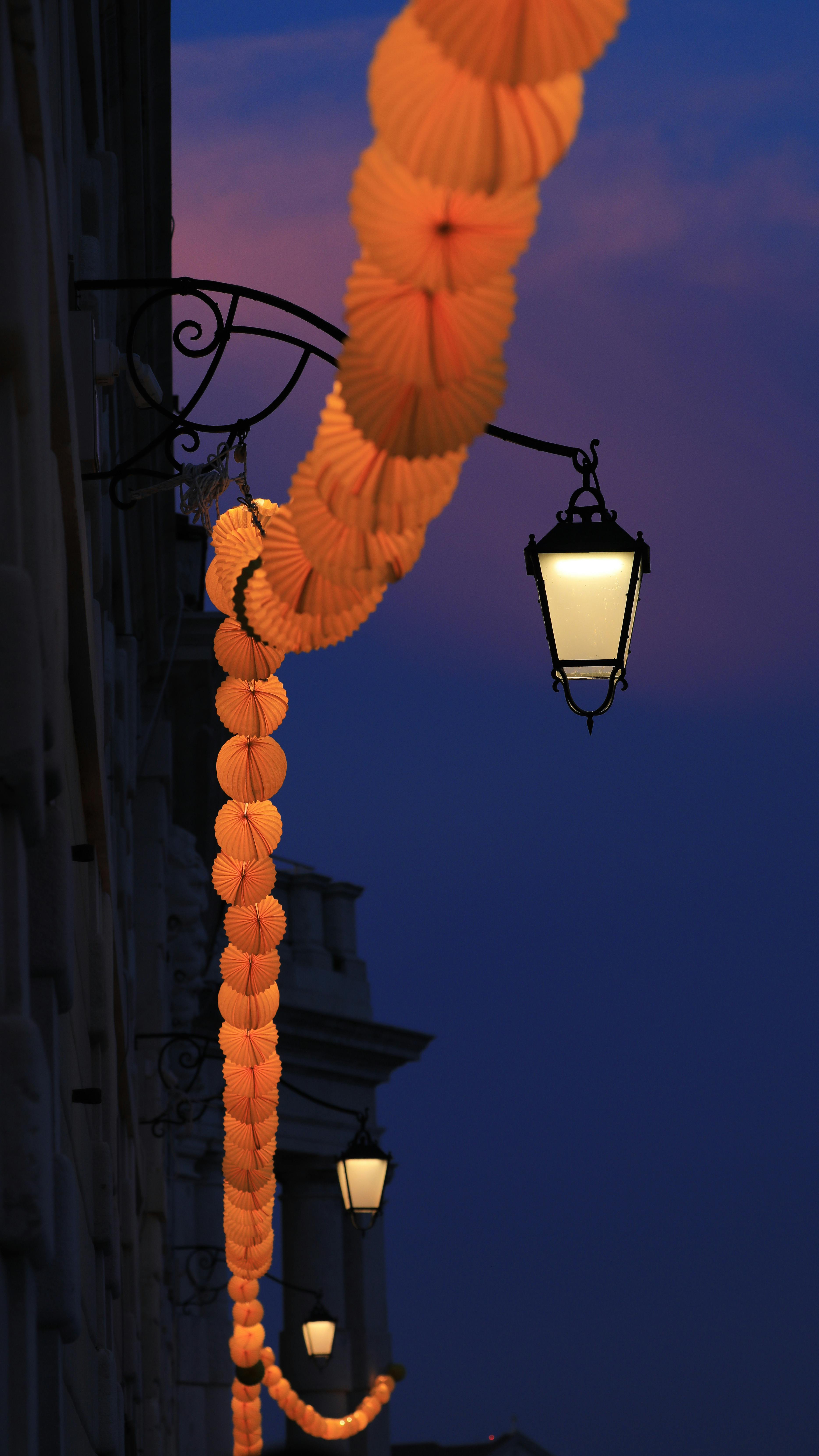 Illuminated City Streetlights and Lanterns · Free Stock Photo